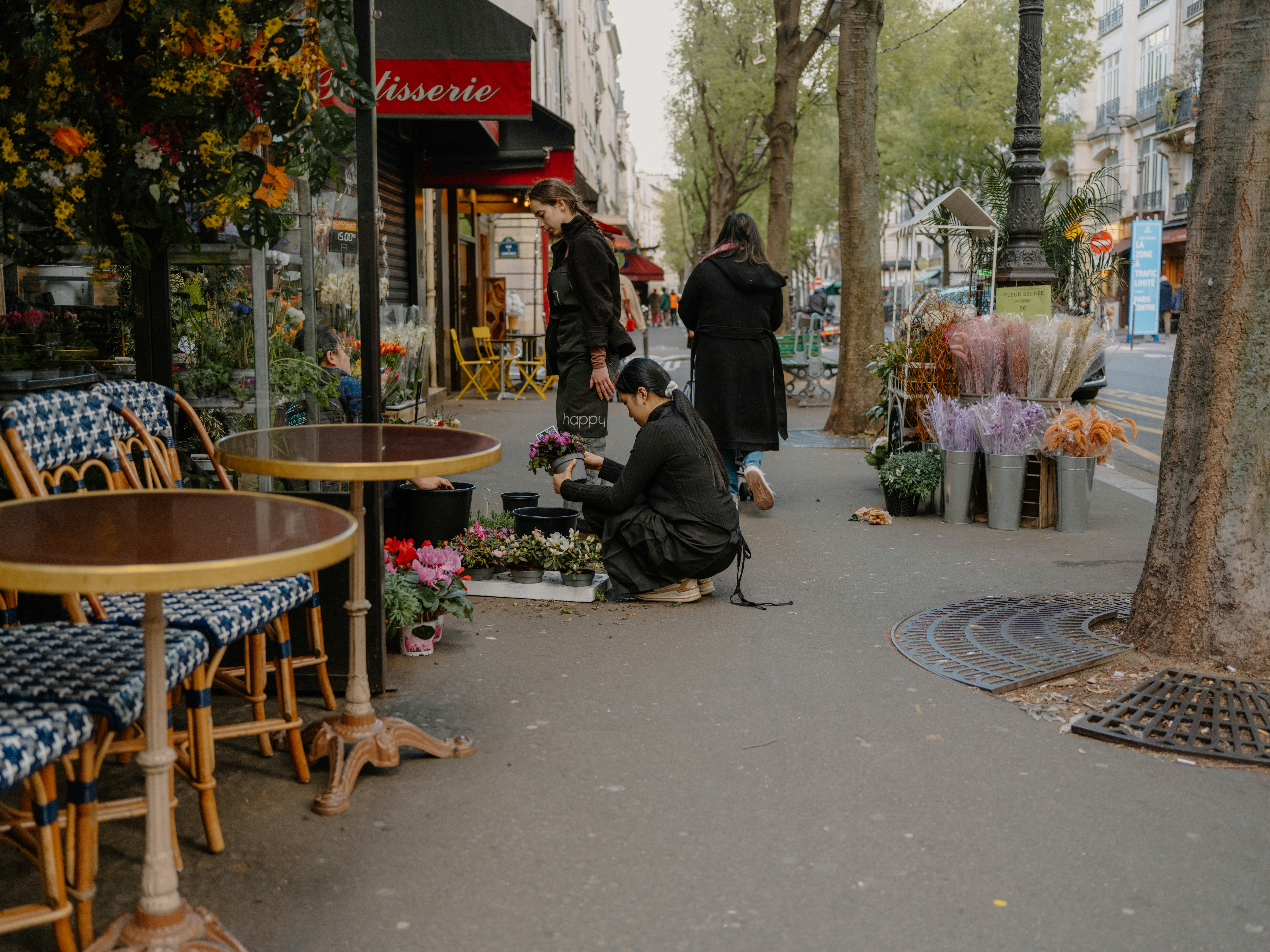 Street Café Portrait: A Moment by the Parisian Walkway