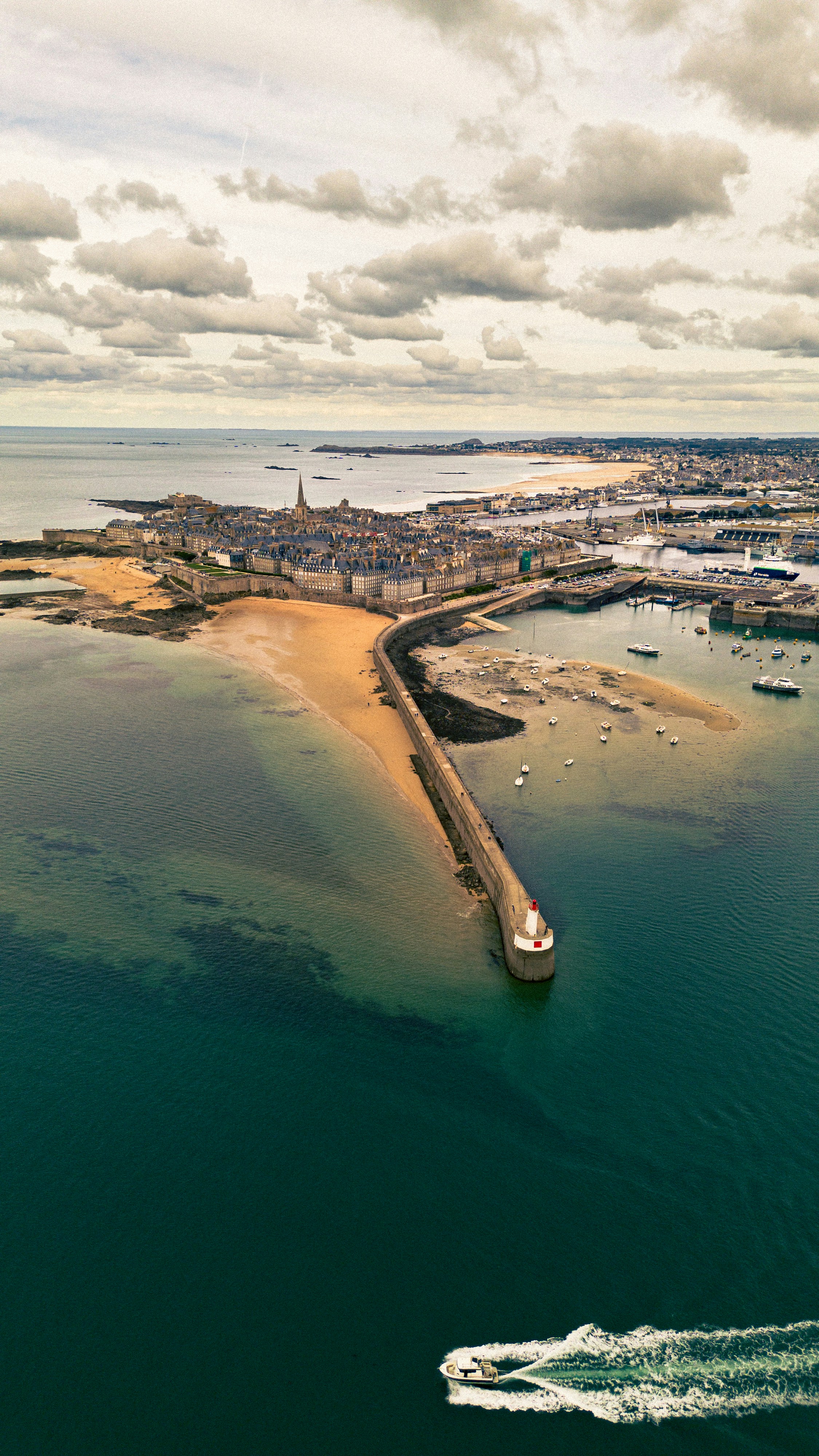 Harbor Sprawl: A Coastal Town Meets a Long Breakwater