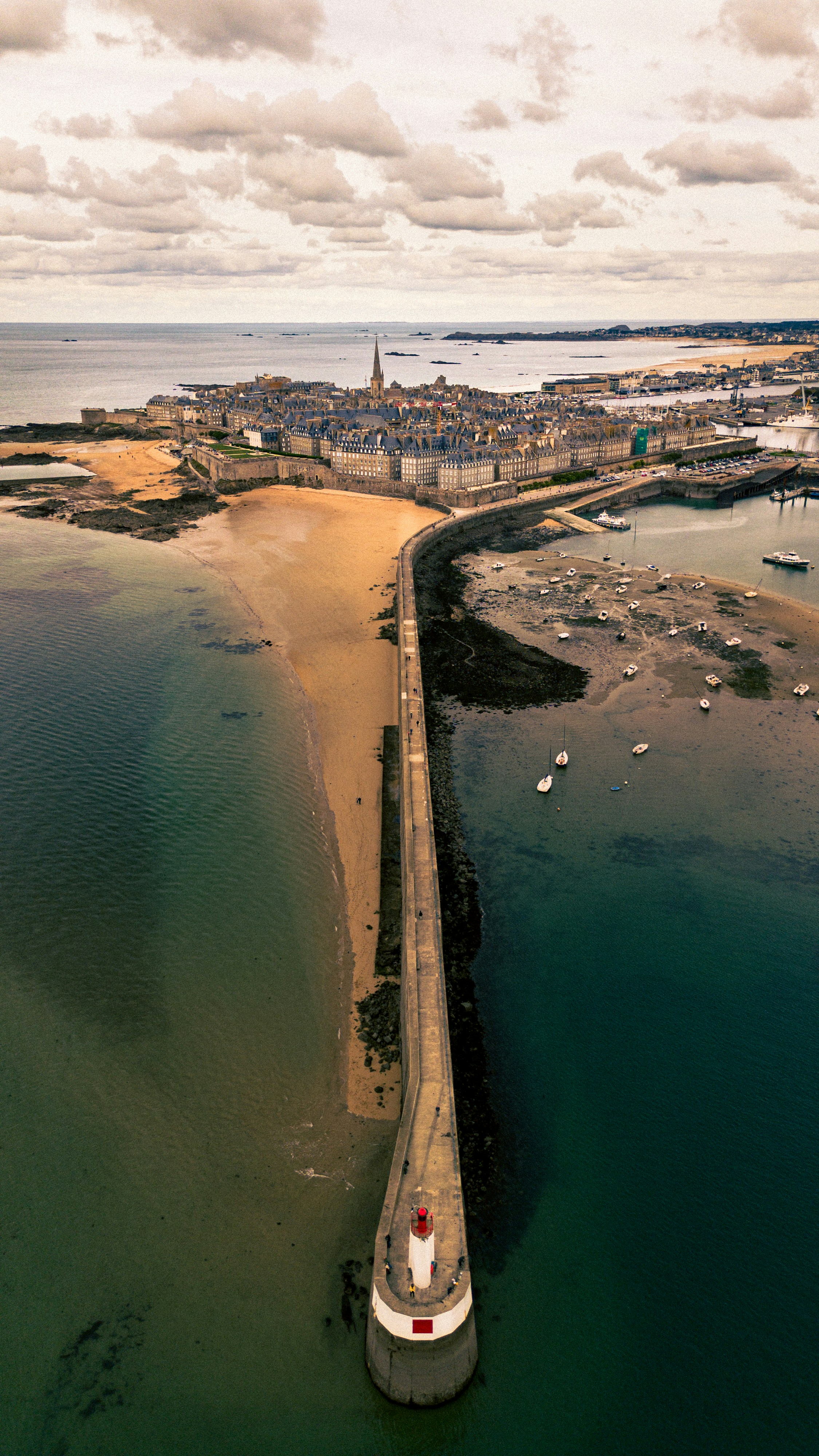 Aerial Crossroad: The Stone Pier Haunting the Tides