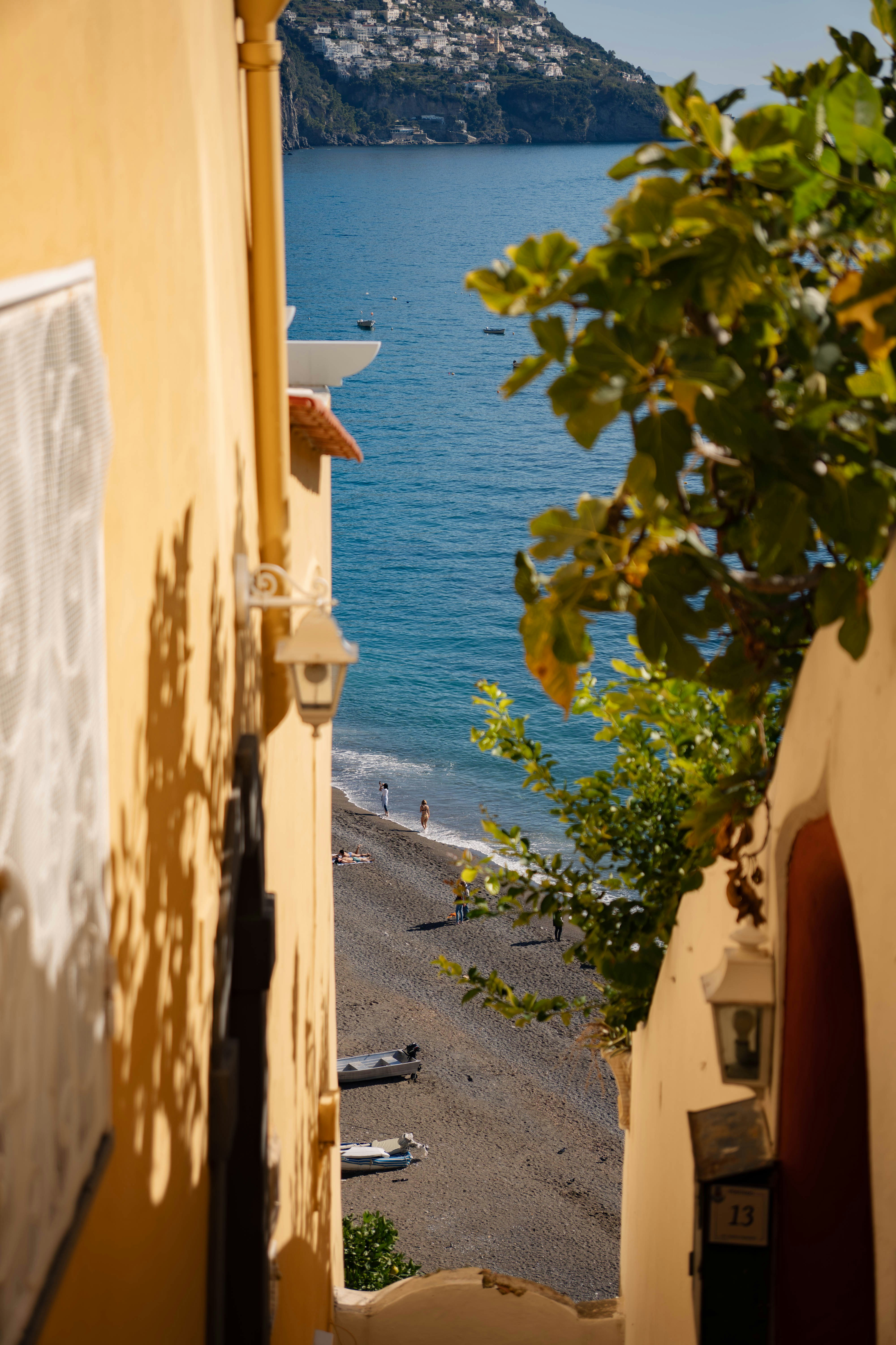 Narrow Mediterranean Alley Framing a Sea-Vista Path