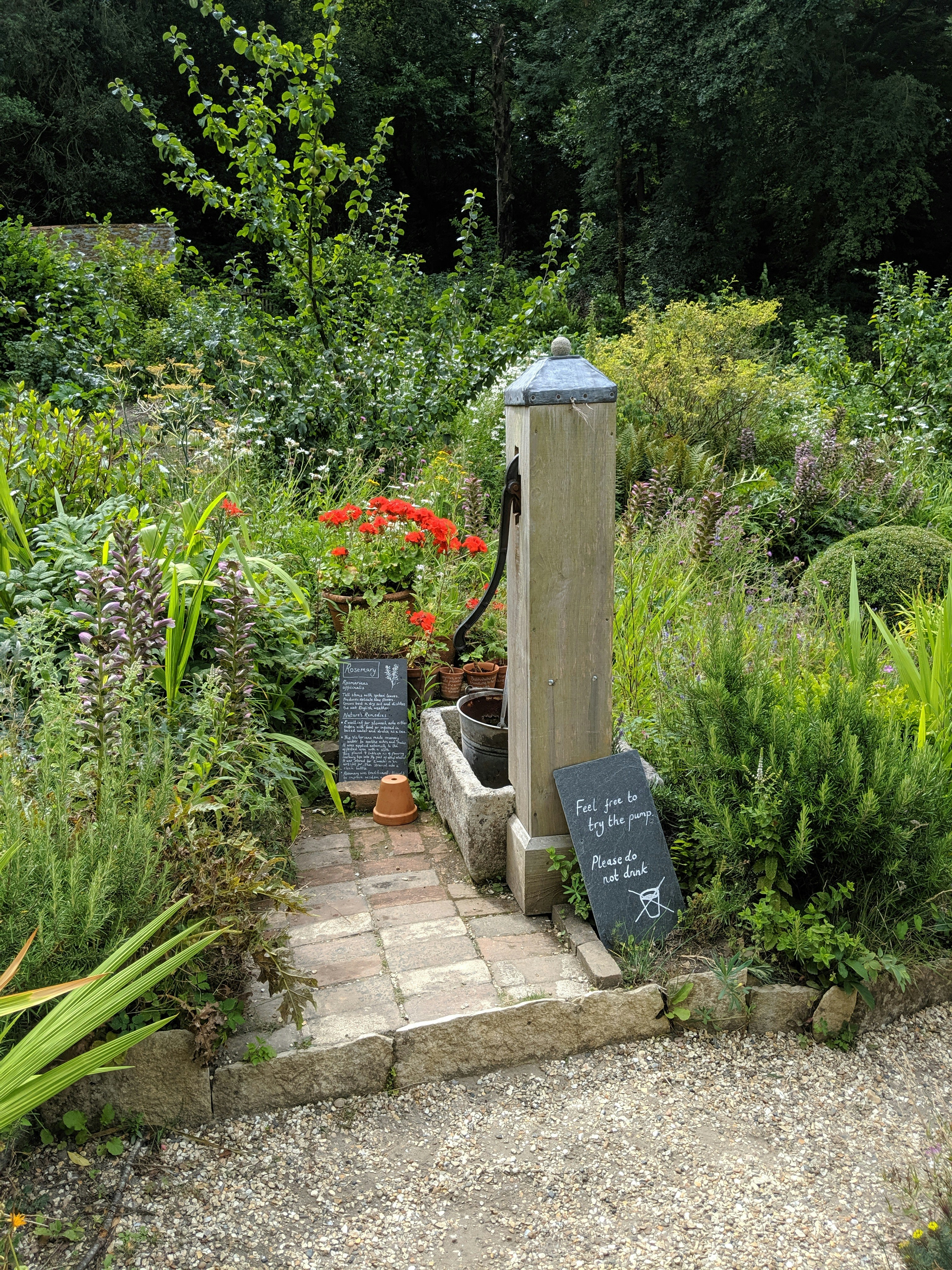Historic Well in a Flourish of Garden Plants
