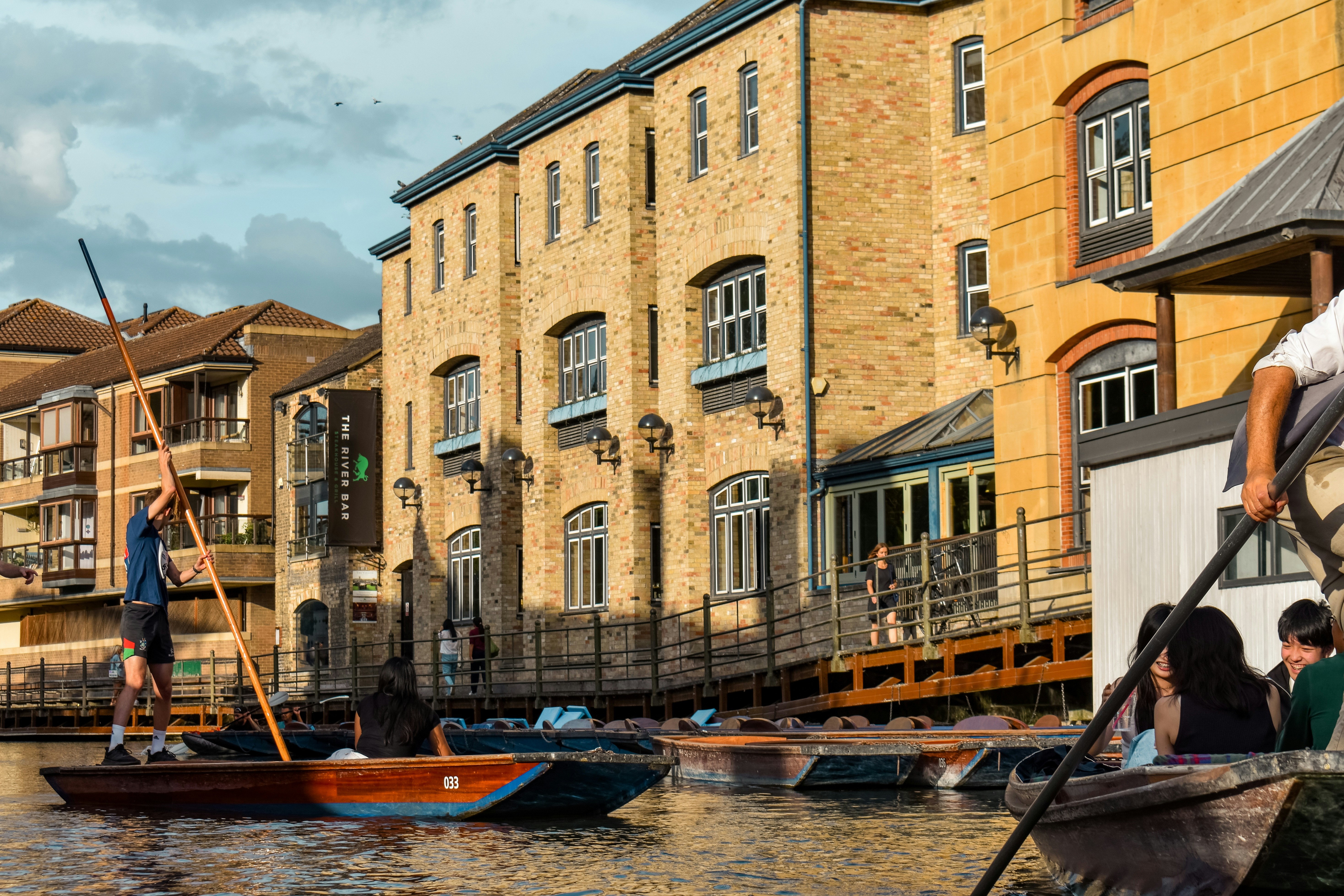 Canal Vistas: Boats, Brick Facades, and Busy Waterways