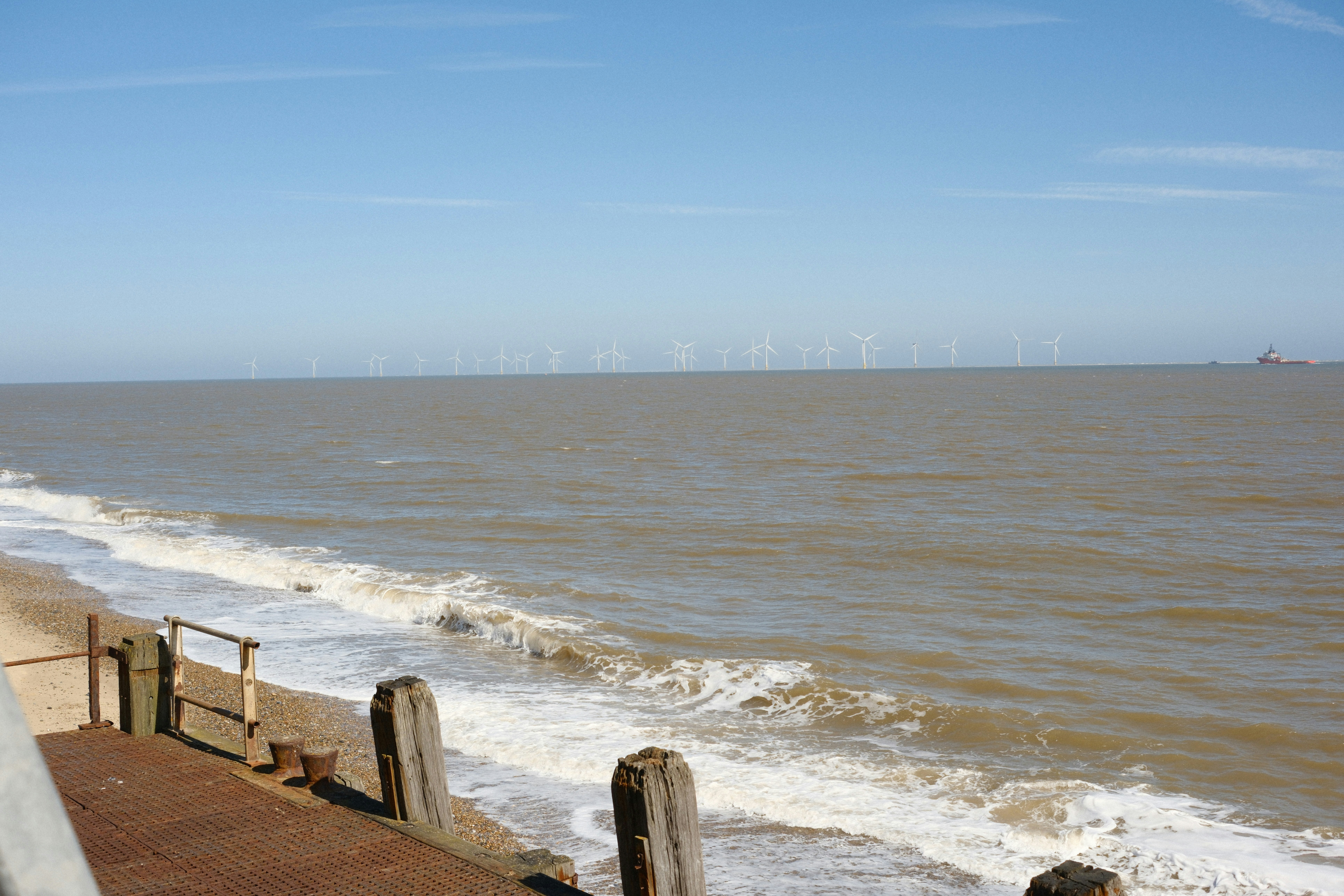 Wind Farm Horizon from a Seaside Pier