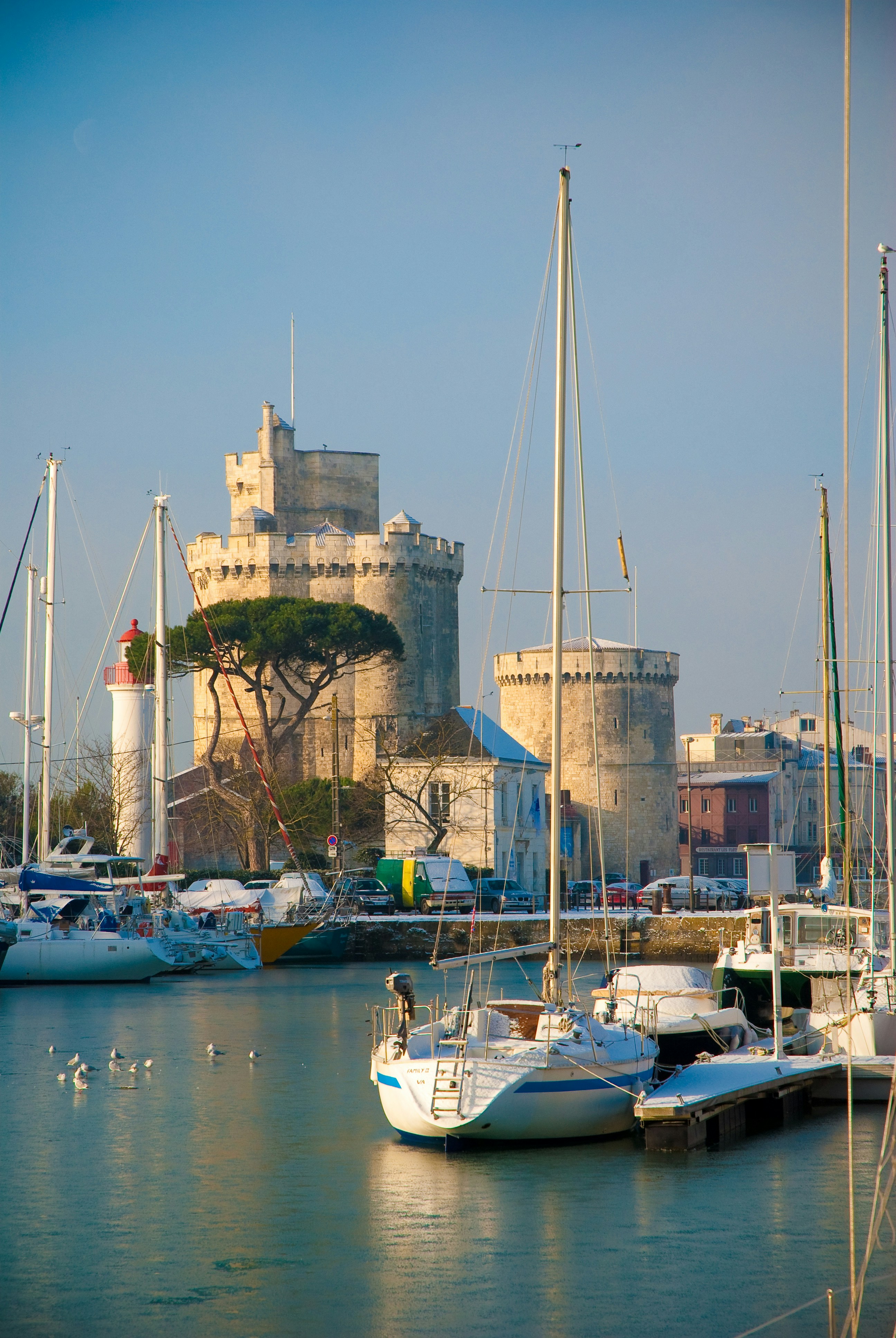 Harbor Sentinel: Historic Towers Over a Quiet Marina