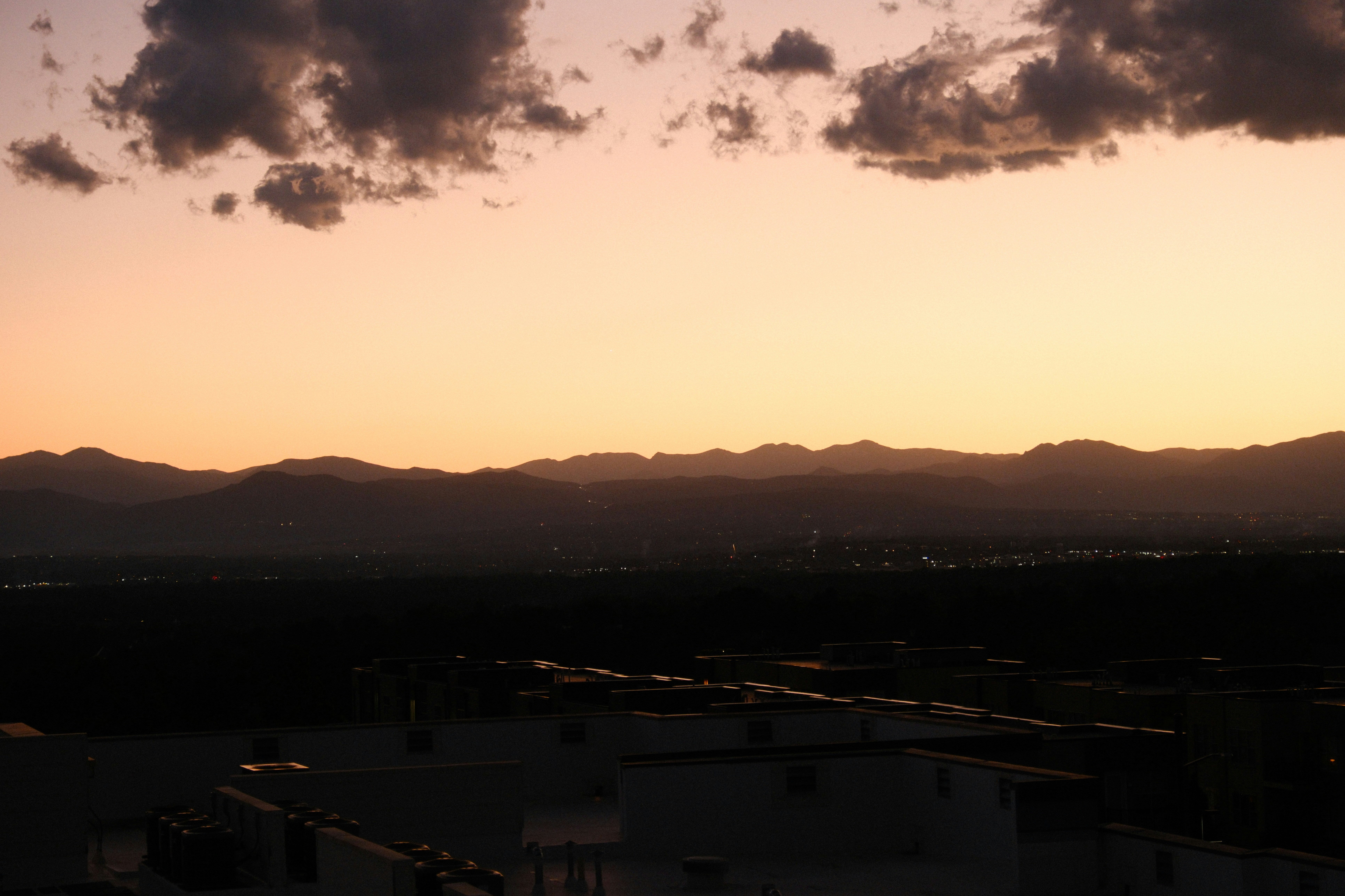 Horizon Quiet: Dusk Over Silent Rooftops