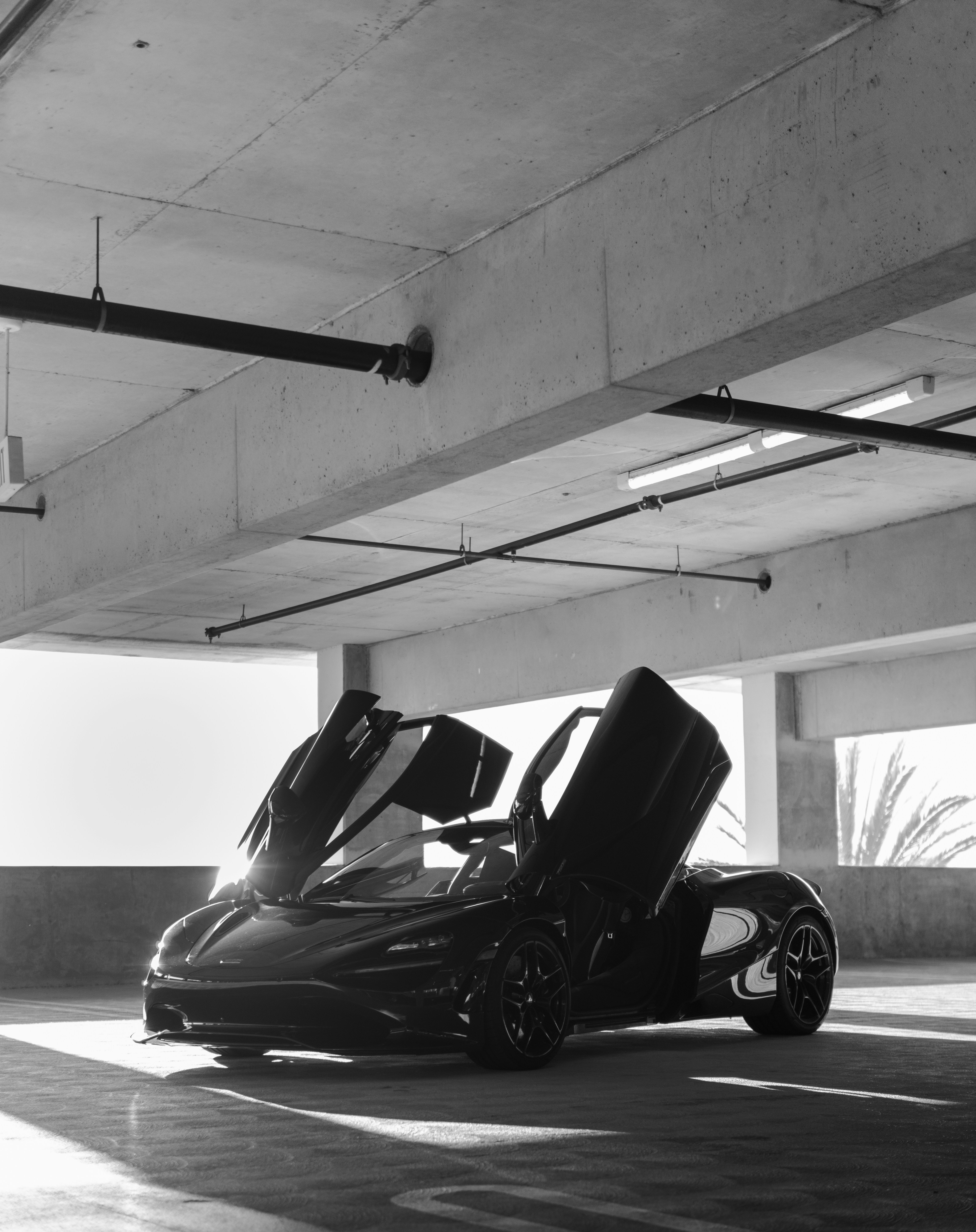 Open Doors, Closed Doors: A Hyperbolic Car in an Empty Concrete Garage