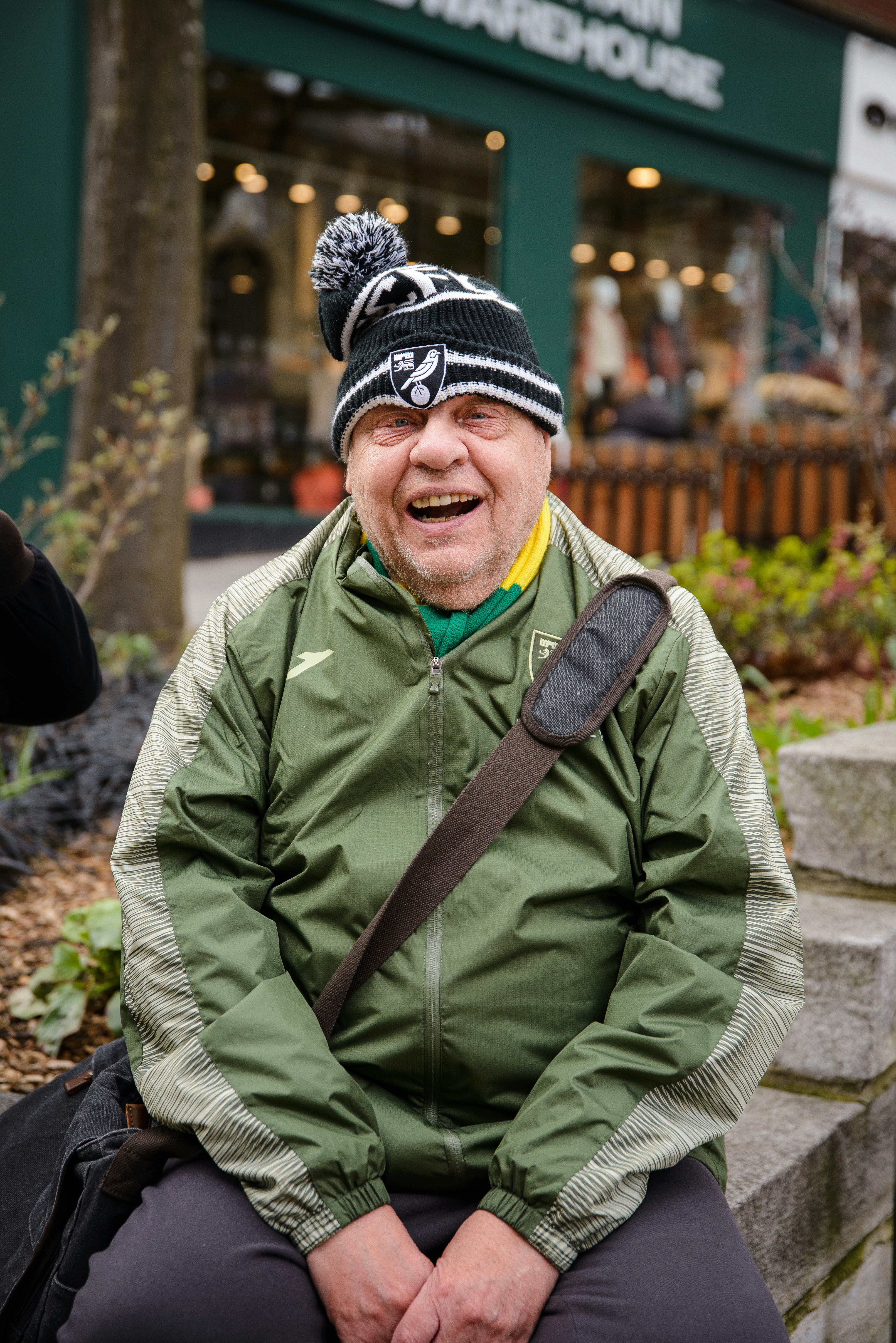 Smiling Helper on a City Bench