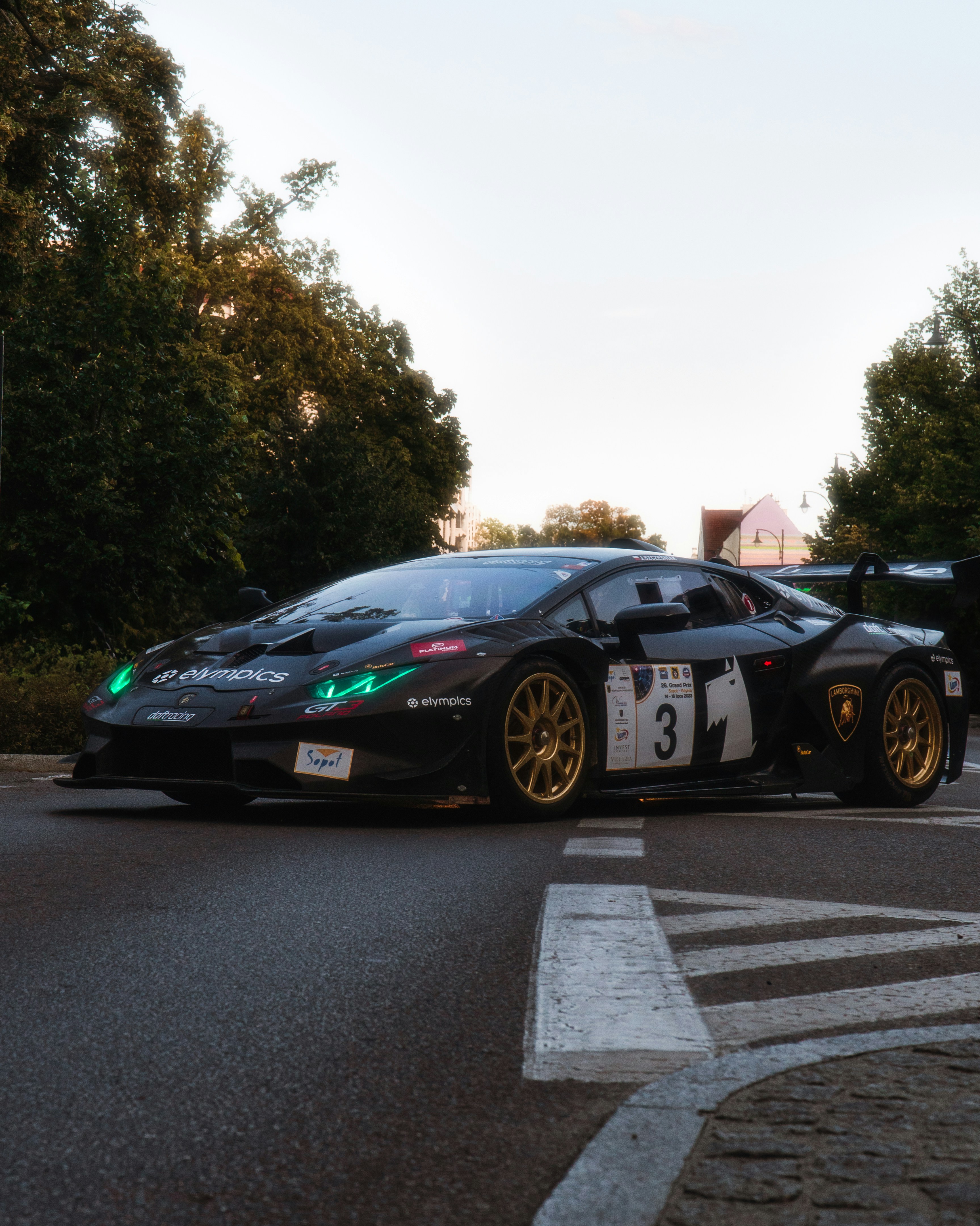 Low-angle Lamborghini Huracán GT3 Resting on a Quiet Street