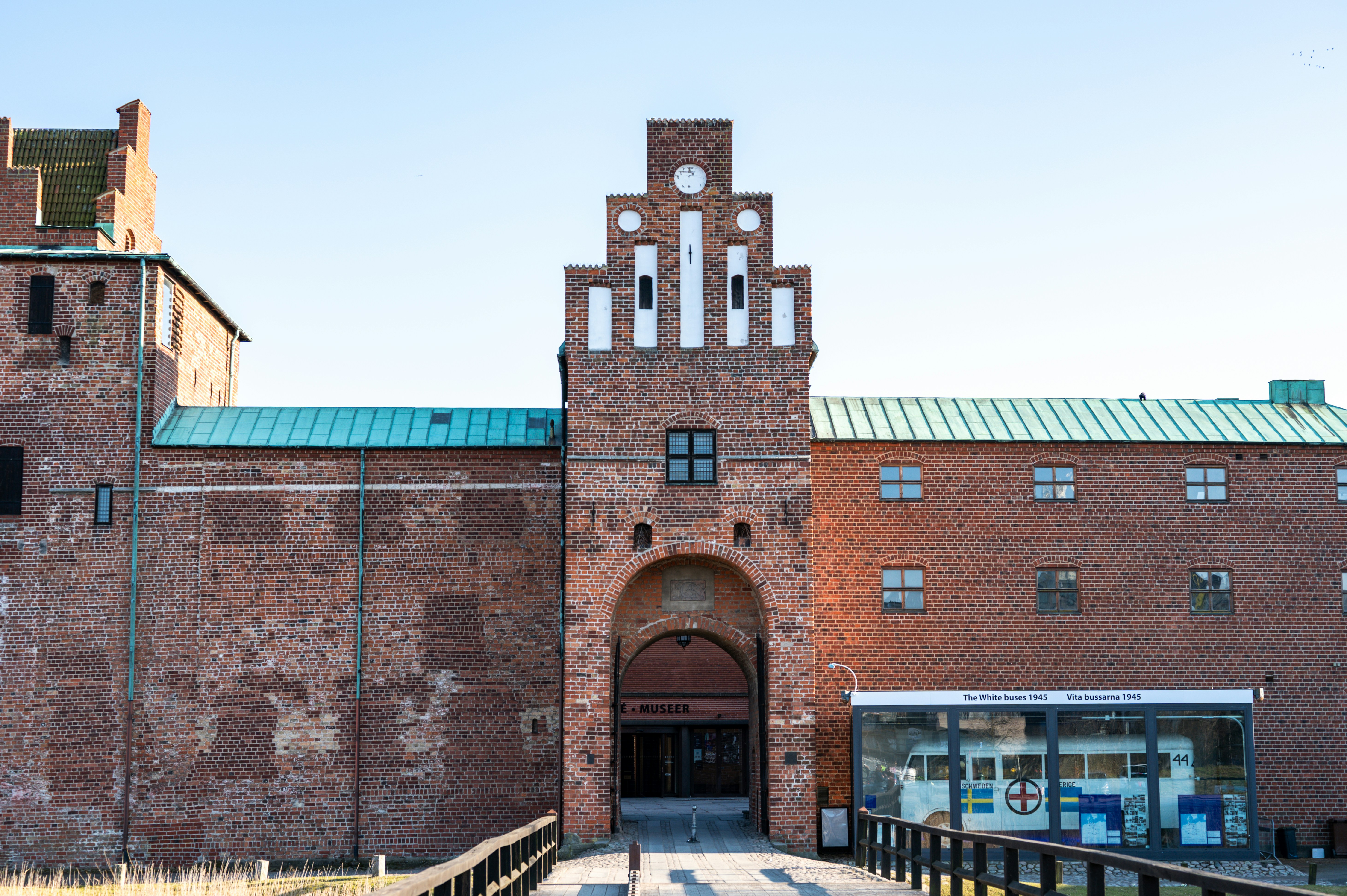 Brick Fortress Gate: A Red Brick Panorama with a Central Archway