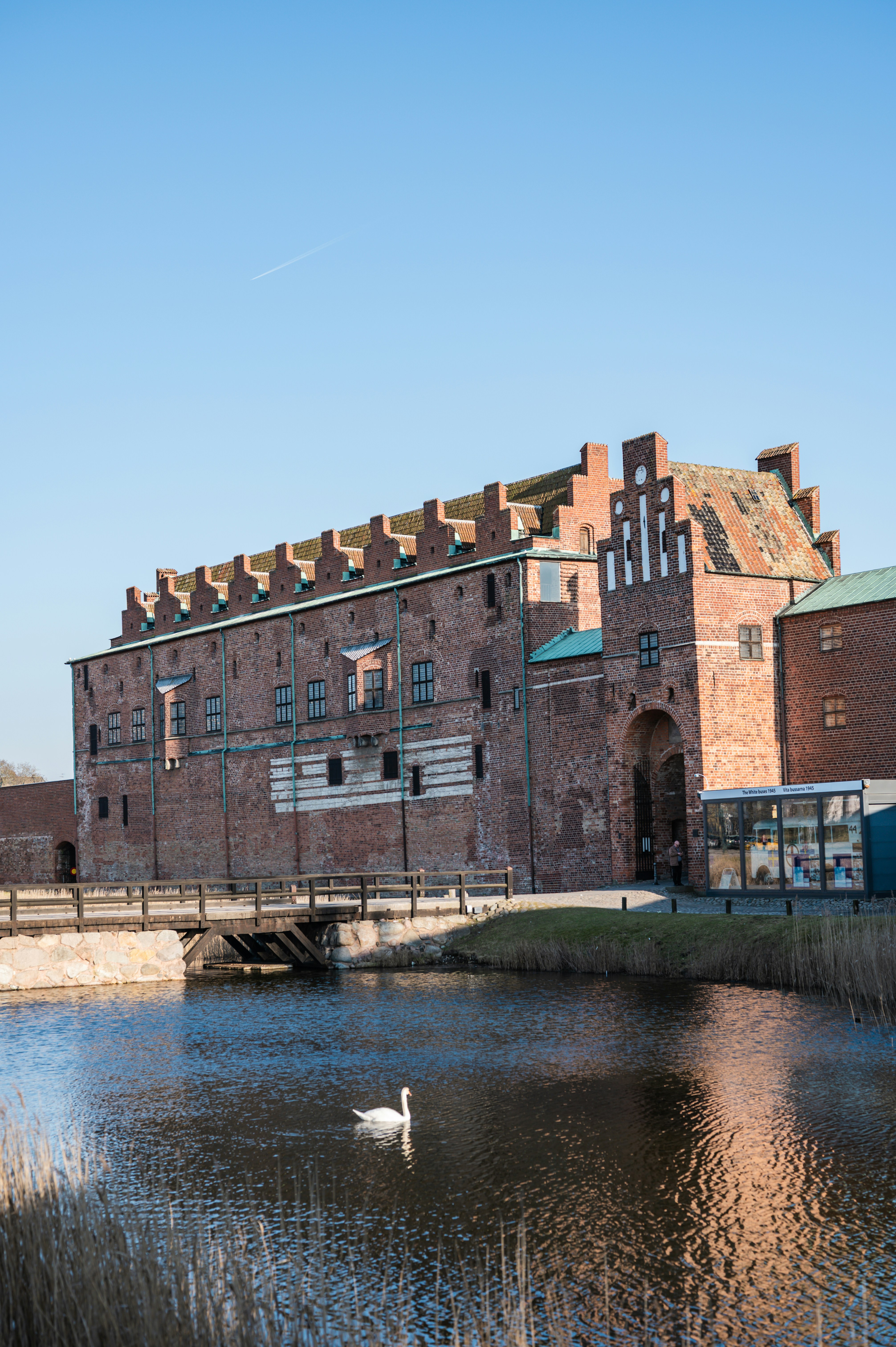 Brick Fortress by the Water: A Quiet Riverside at Dusk