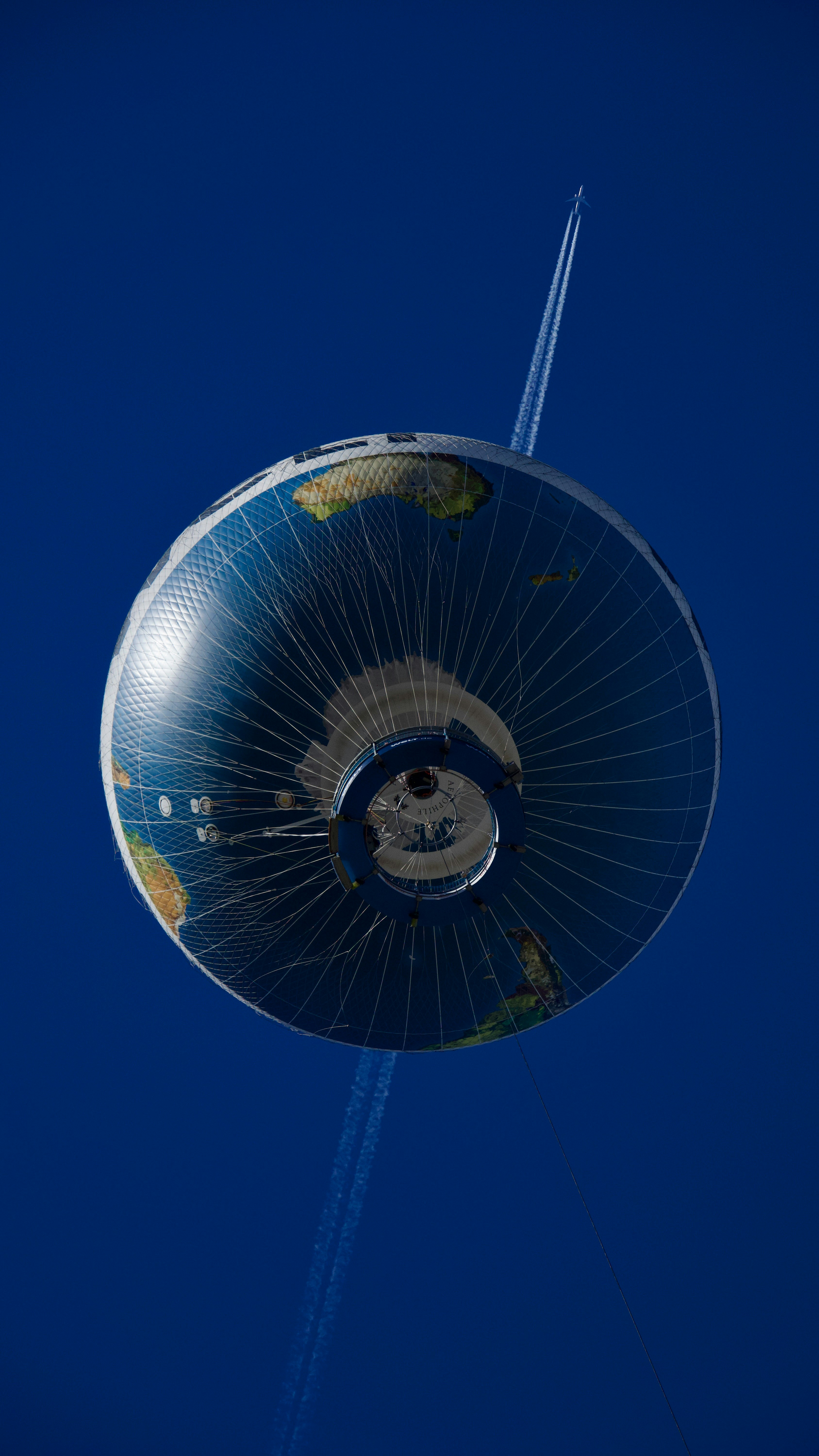 Globe in Orbit: An Aerial Ring of Blue