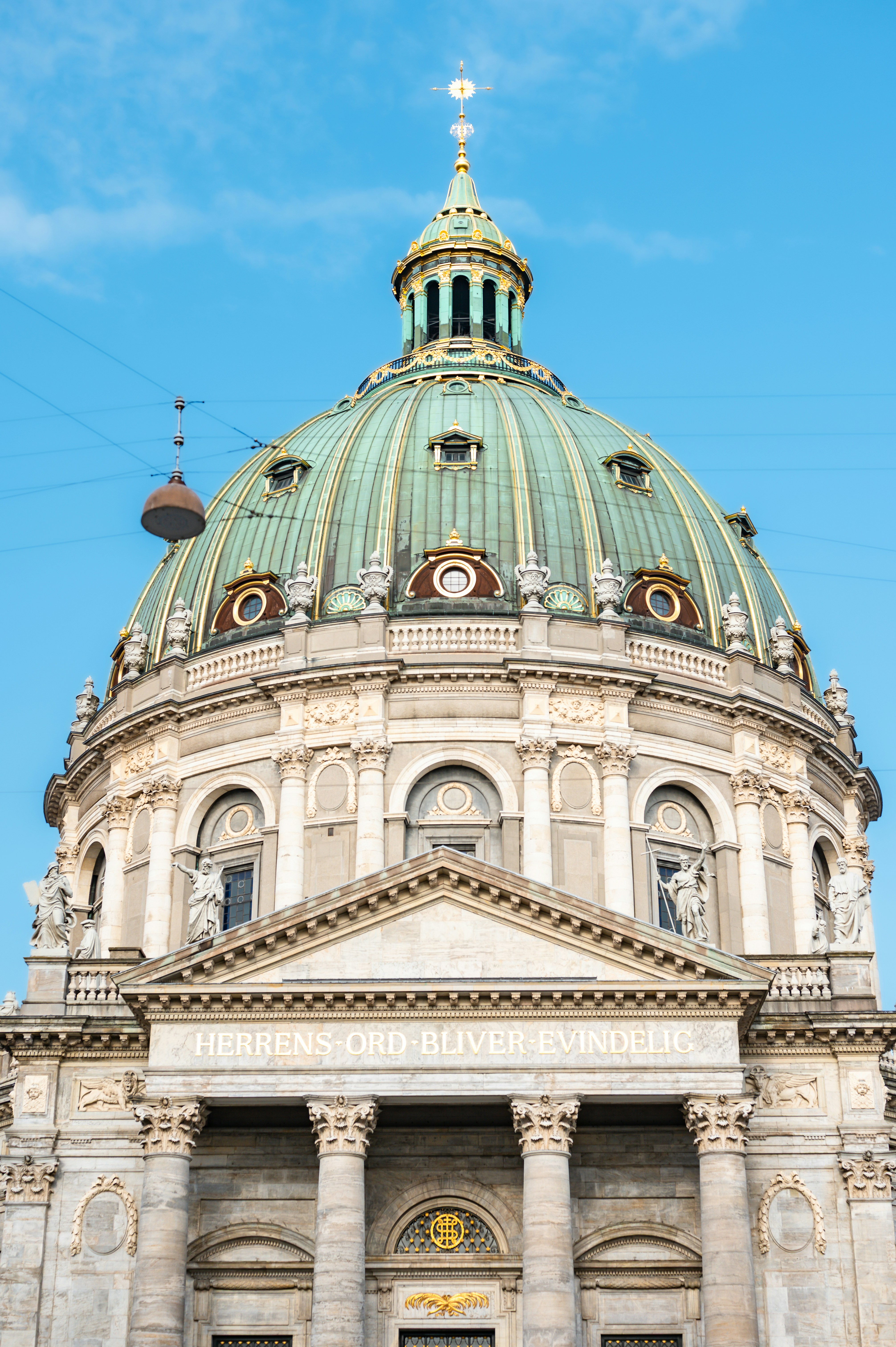 Civic Dome in Blue Sky: A Baroque Facade Crowned by a Verdigris Dome