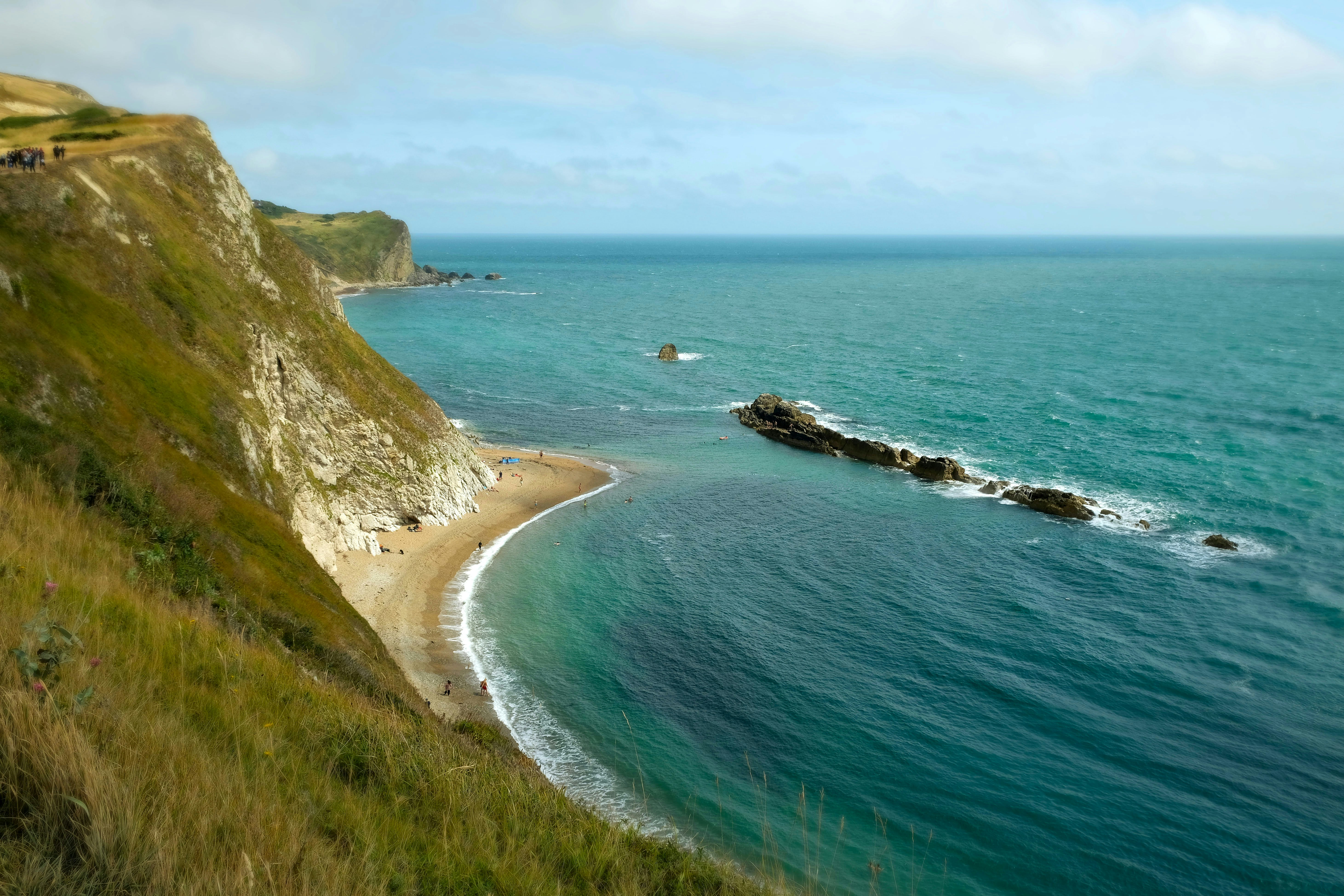 Clifftop Coastline Embraces the Pacific Light