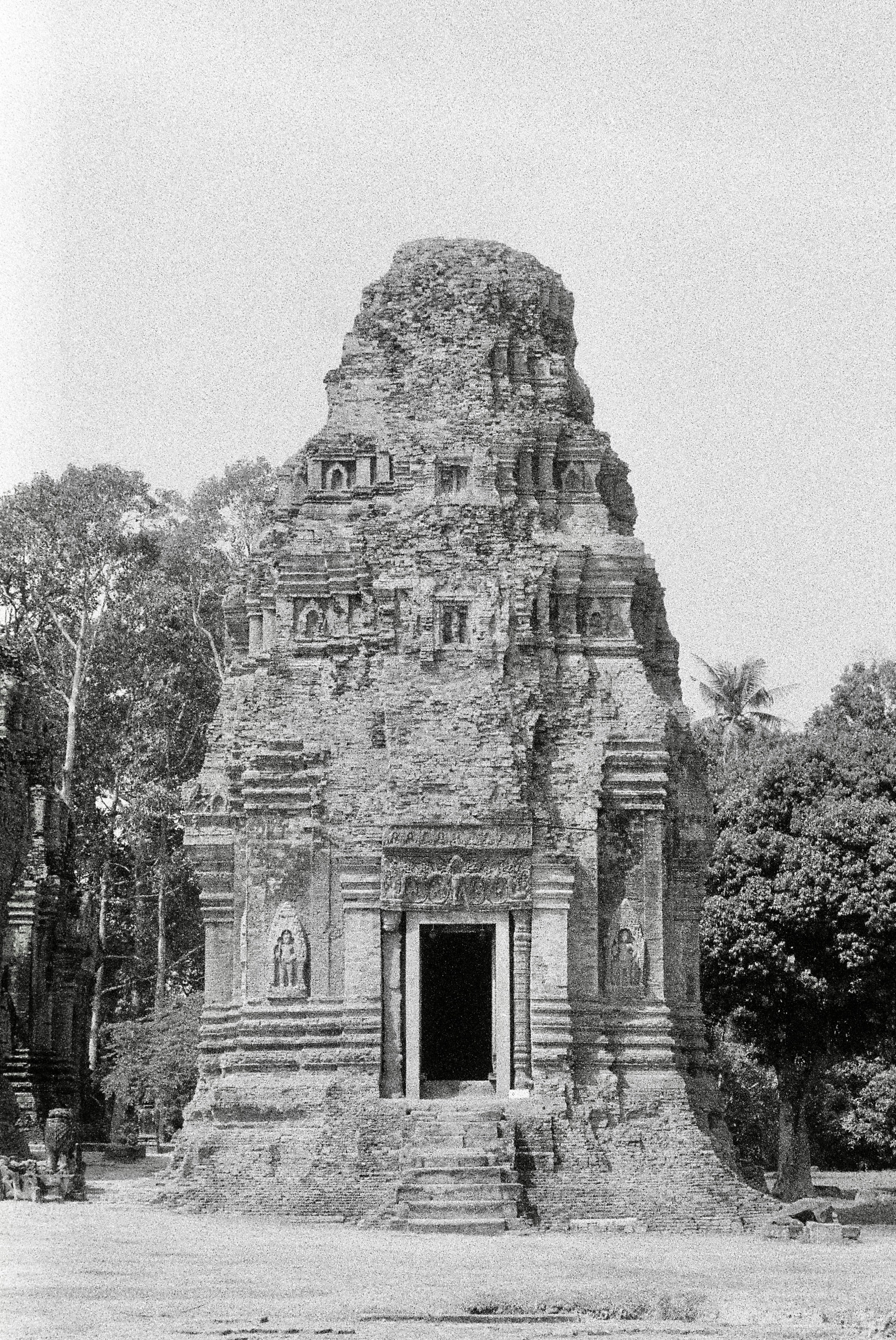 Ruins of a Stone Temple Rising from the Forest