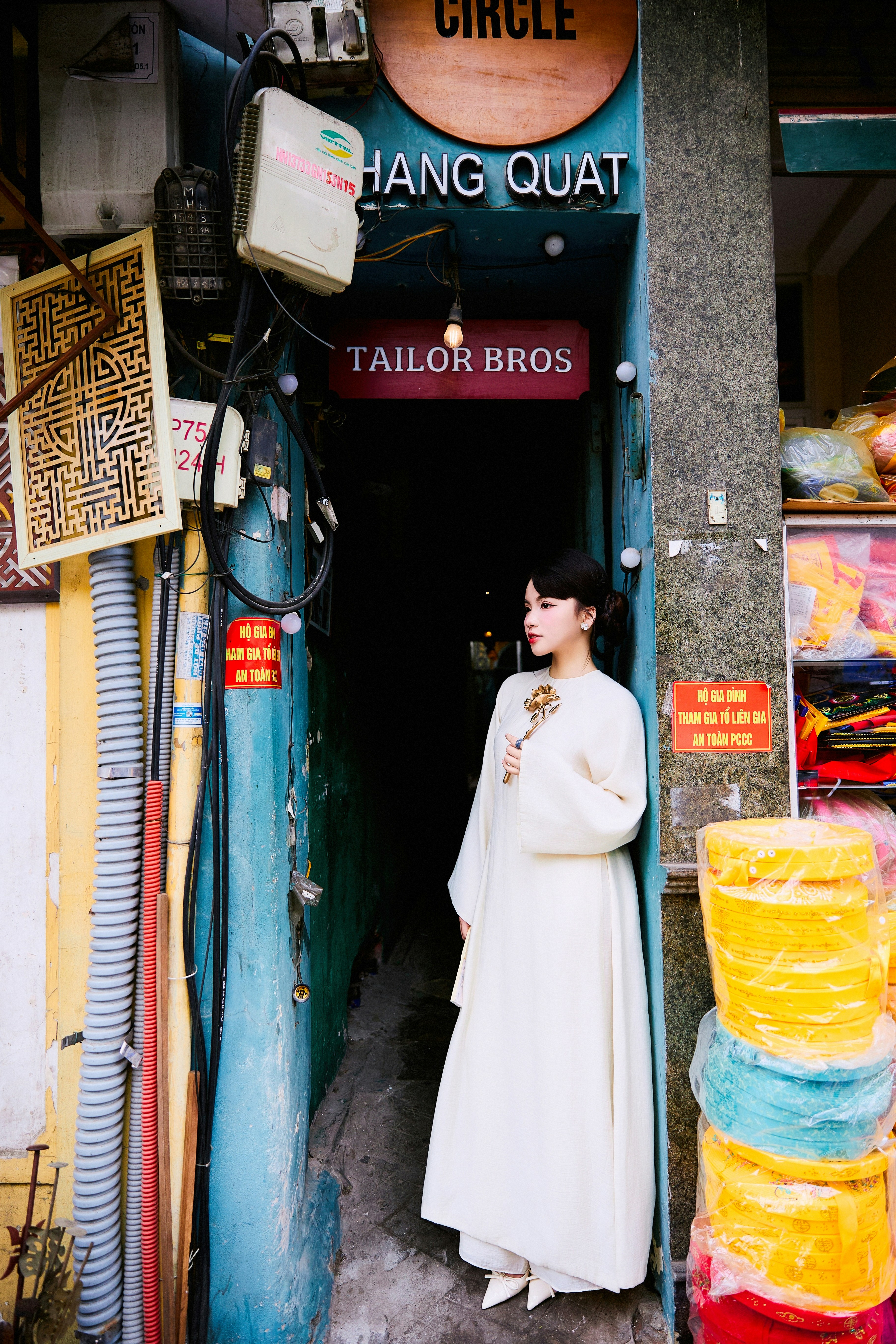 Elegance at the Threshold: A Woman in White in a Narrow Alleyway