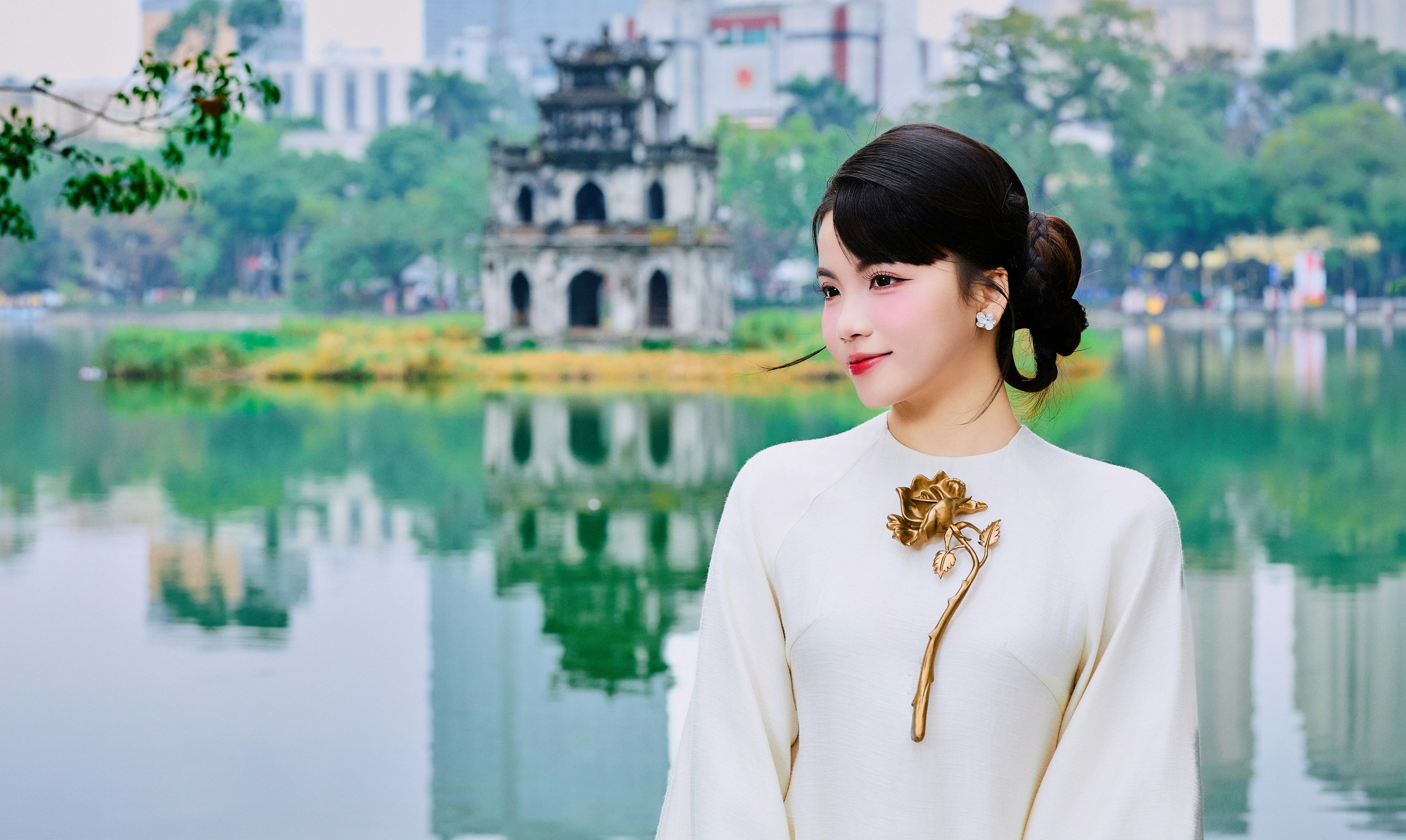 Portrait by the Lake: Graceful Cheongsam and a Serene Pagoda