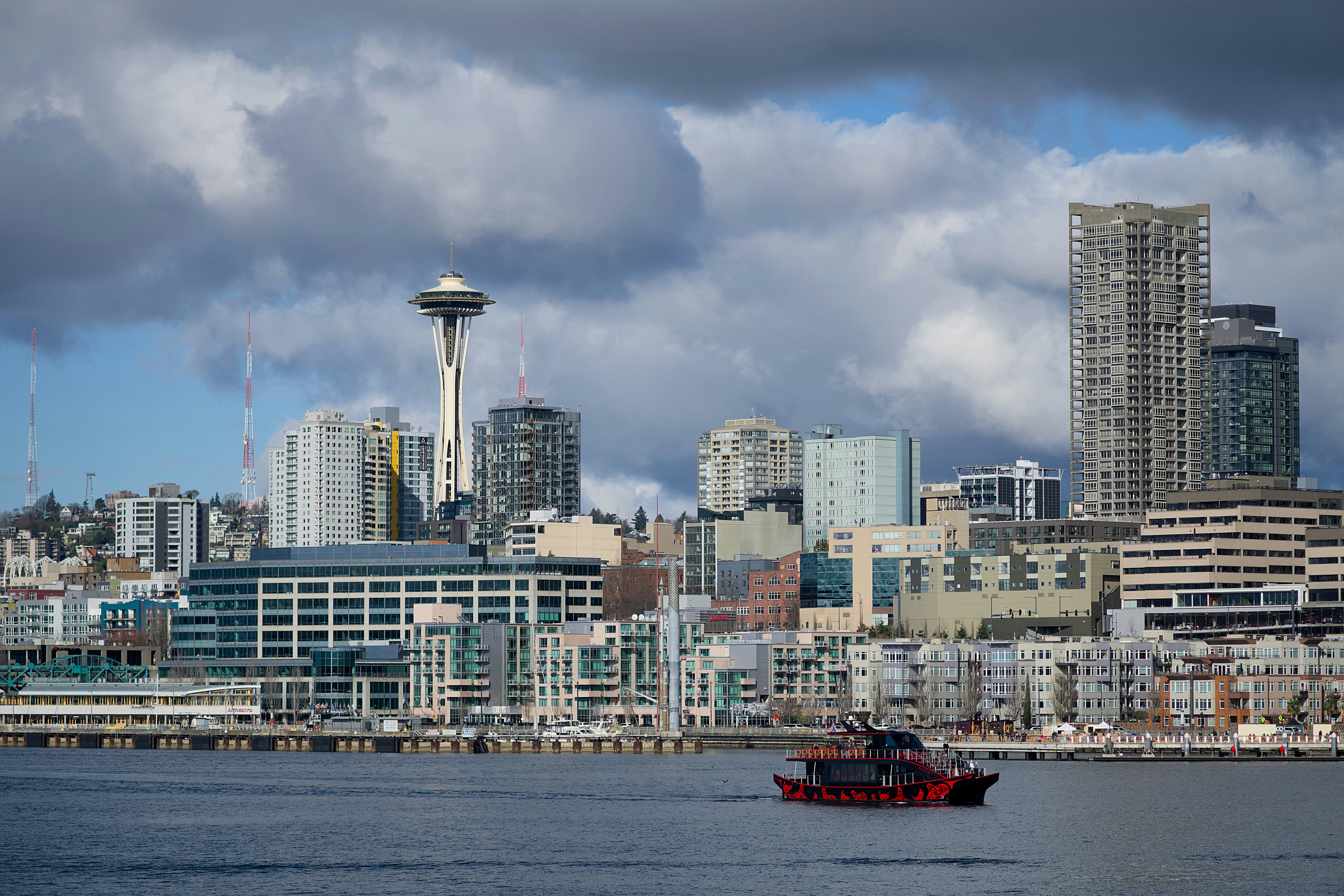 Seattle Skyline from the Waterfront: Space Needle and Red Boat in Focus