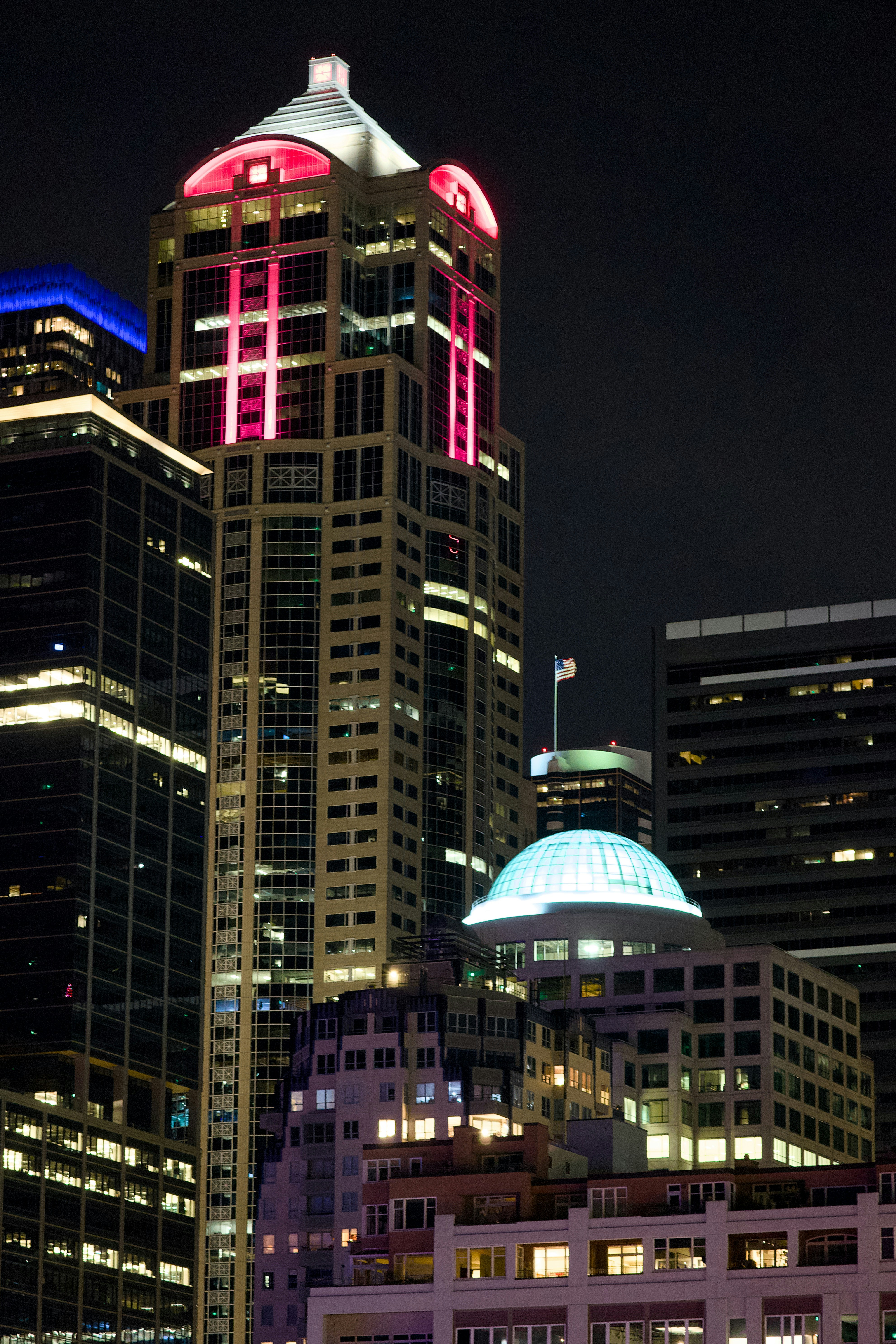 Neon Crown: A Nighttime Portrait of Towering Lights