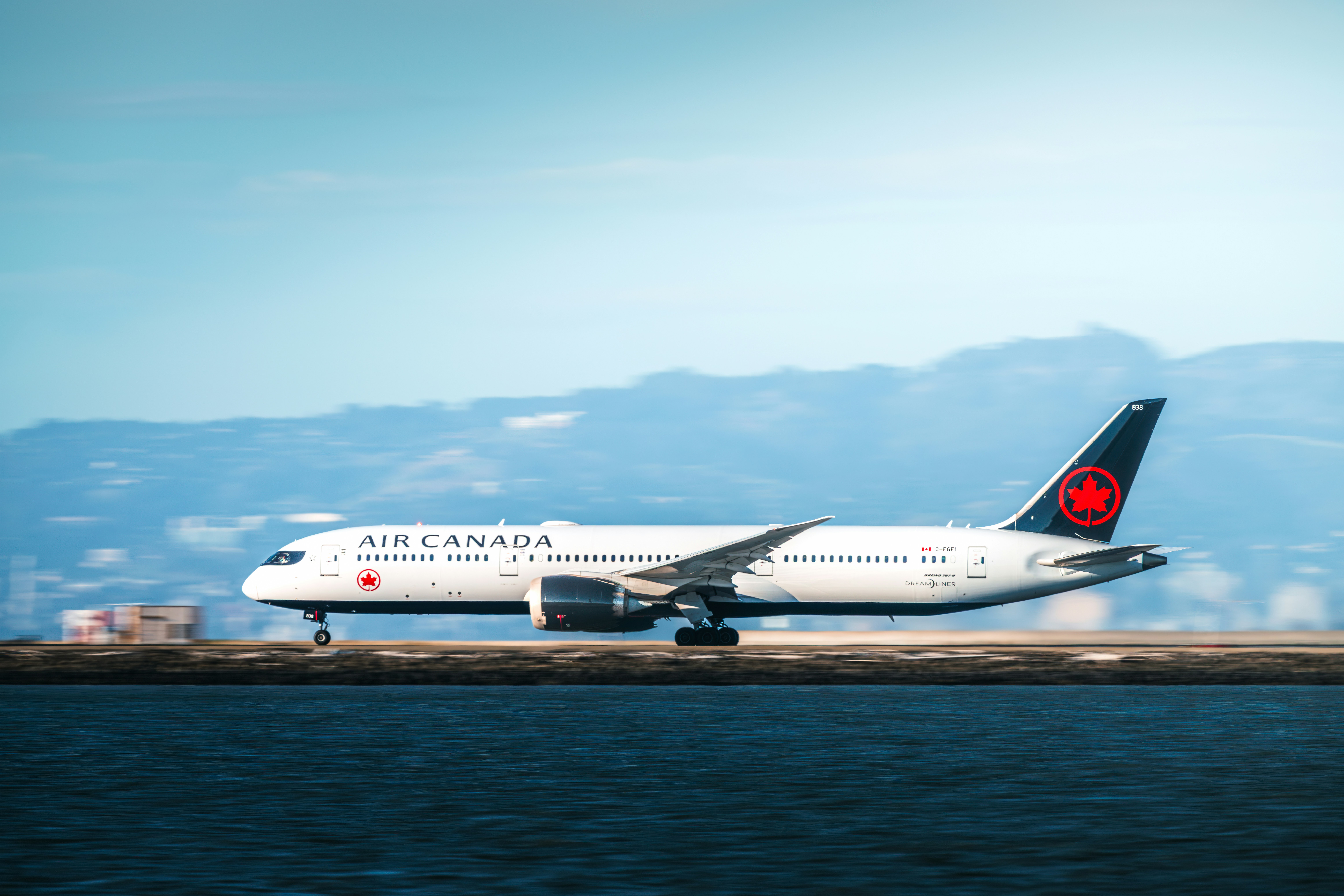 Air Canada Dreamliner: A Calm Glide Across a Coastal Runway