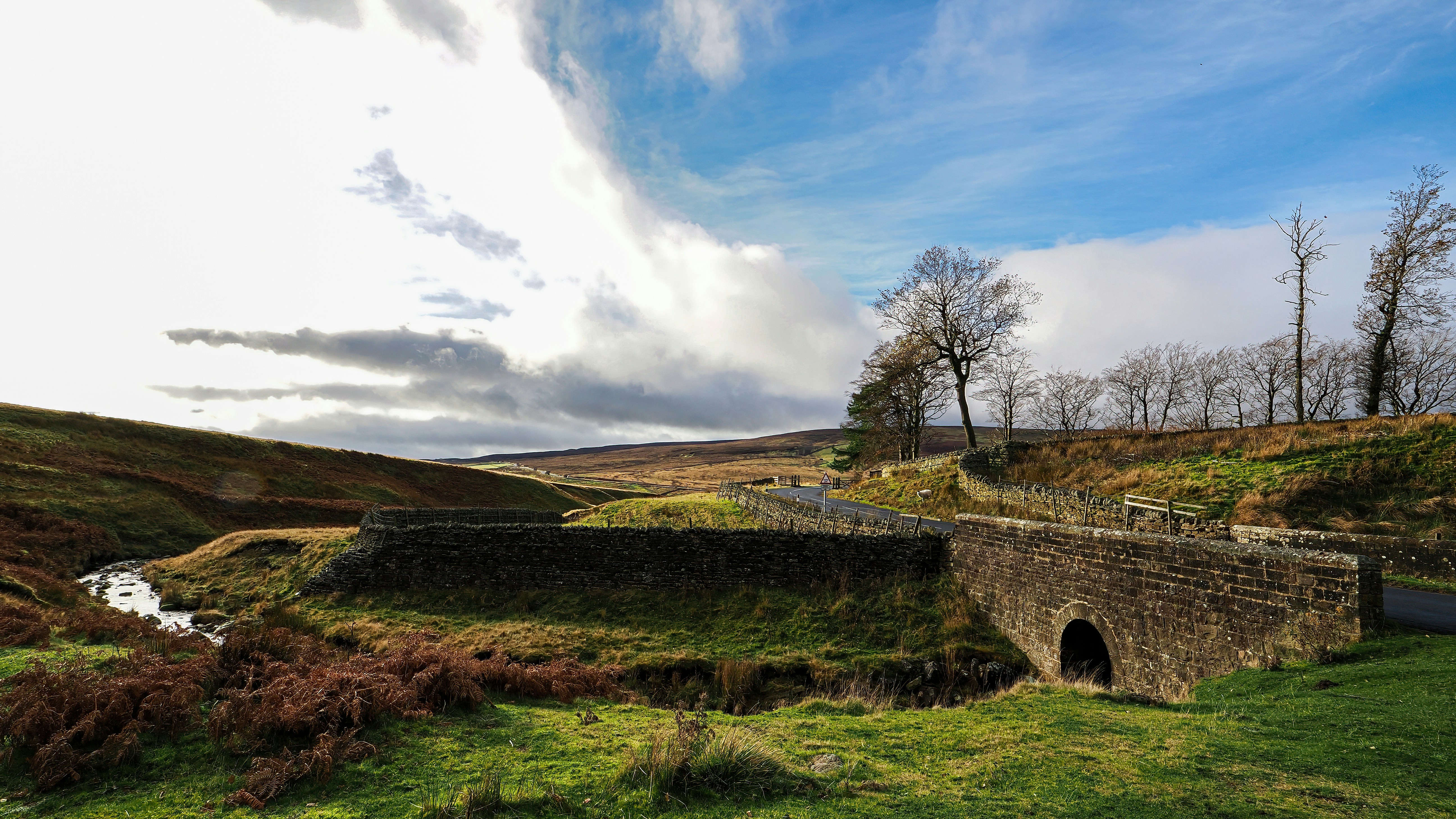 Stone Bridge Over Quiet Moorland Under a Skyscape