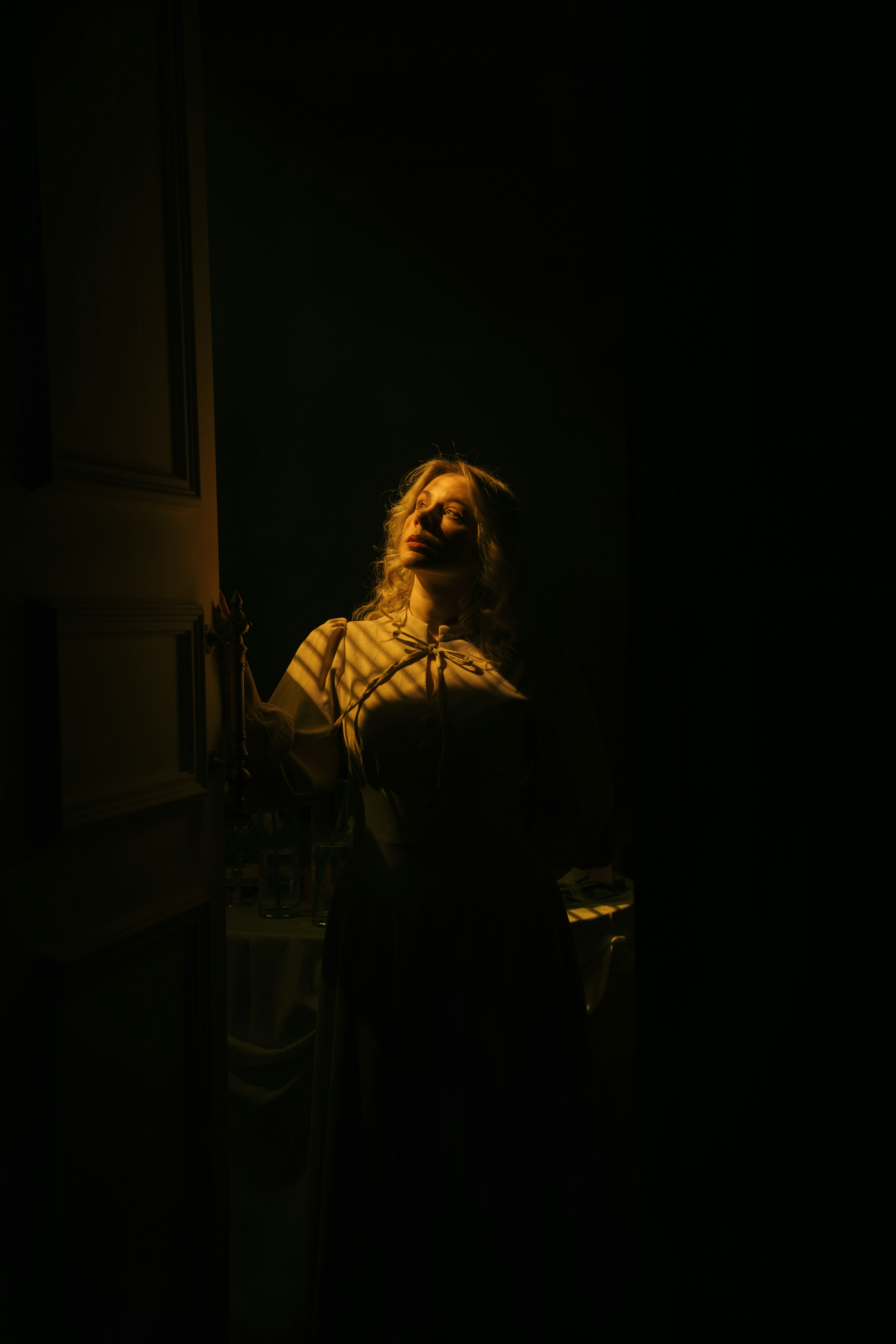 Halo in the Doorway: Quiet Light on a Vintage Portrait