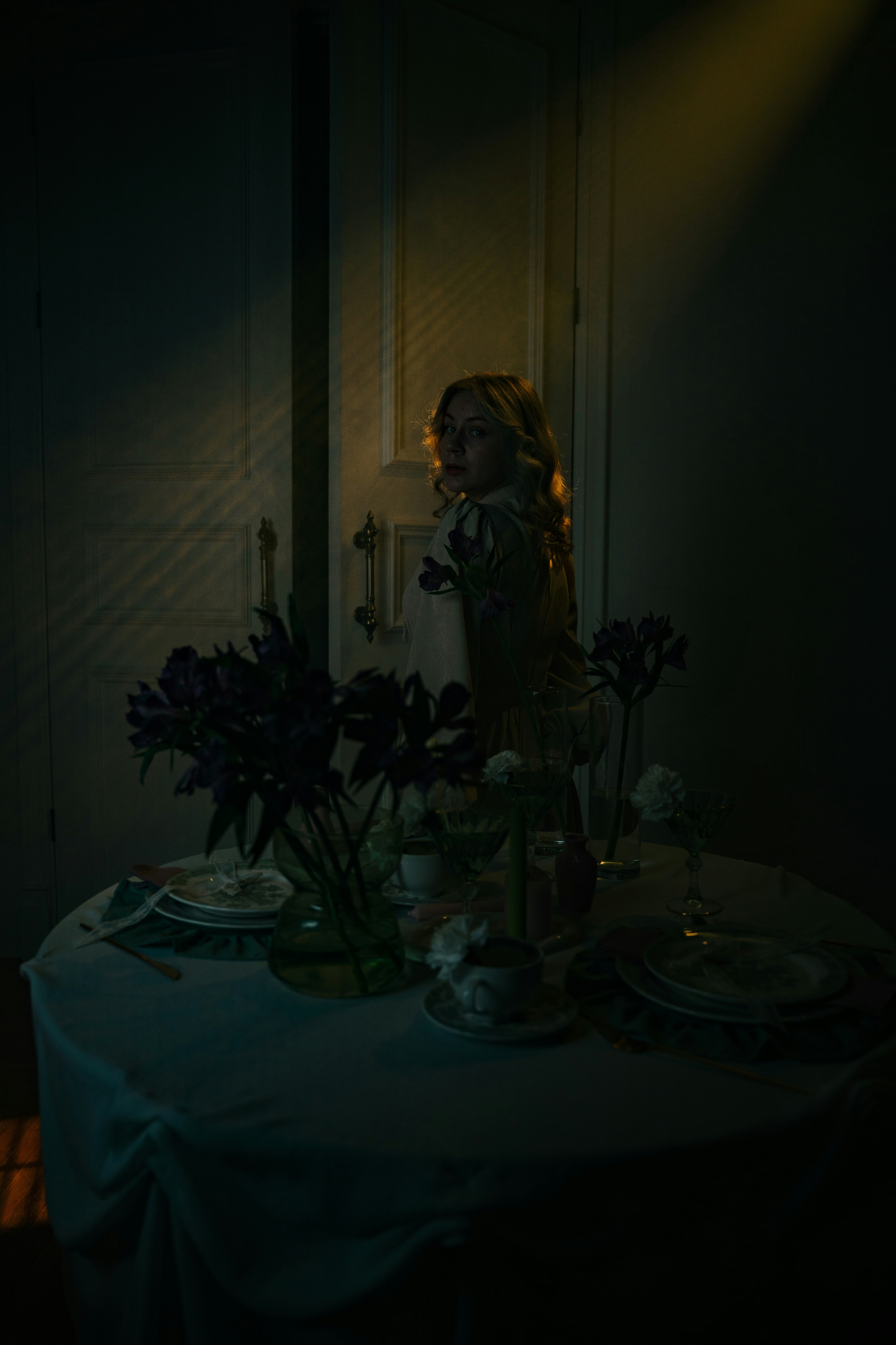 Whispered Gloom at the Dinner Table
