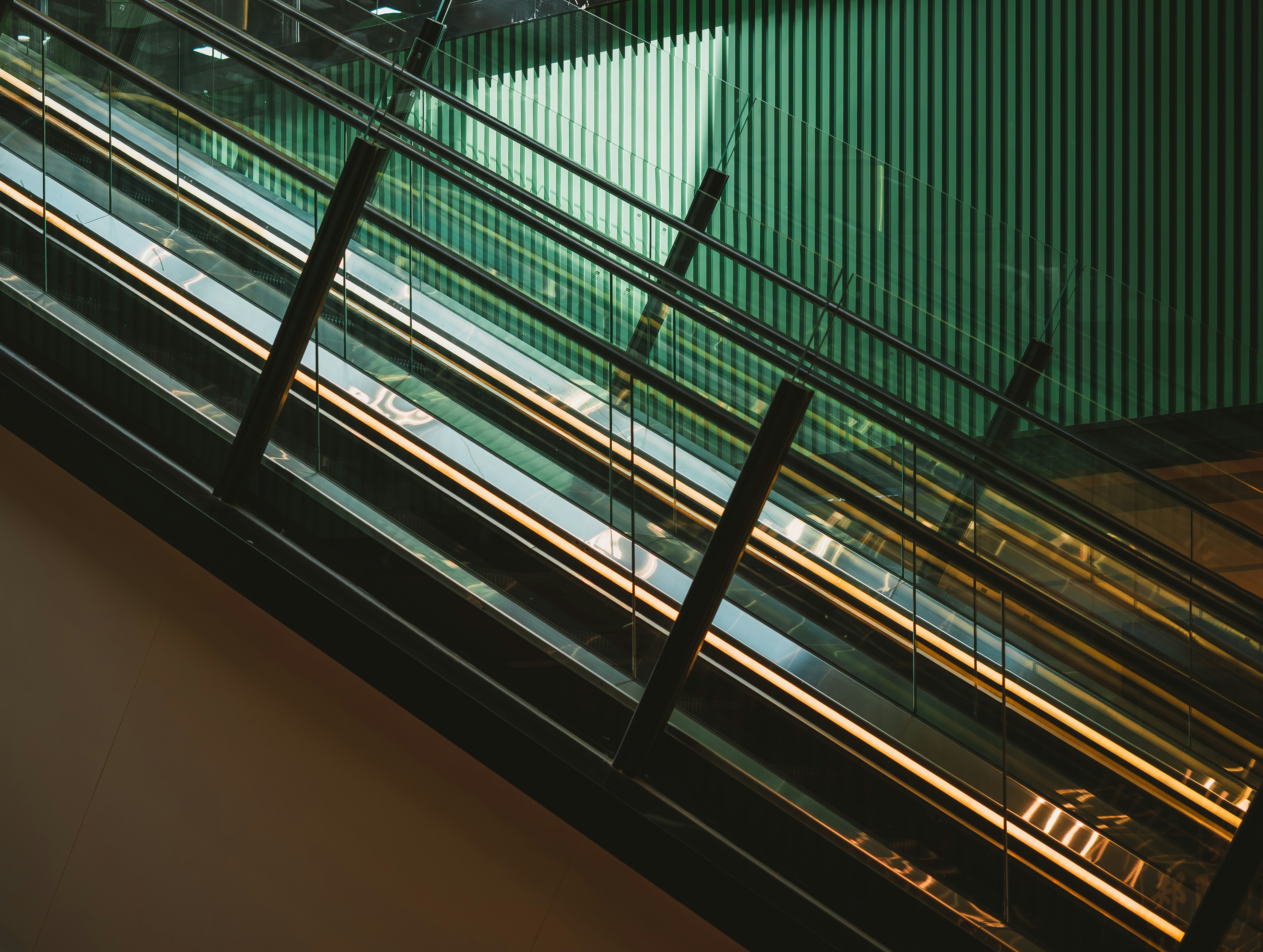 Glassy Ribbons on a Tilted Escalator