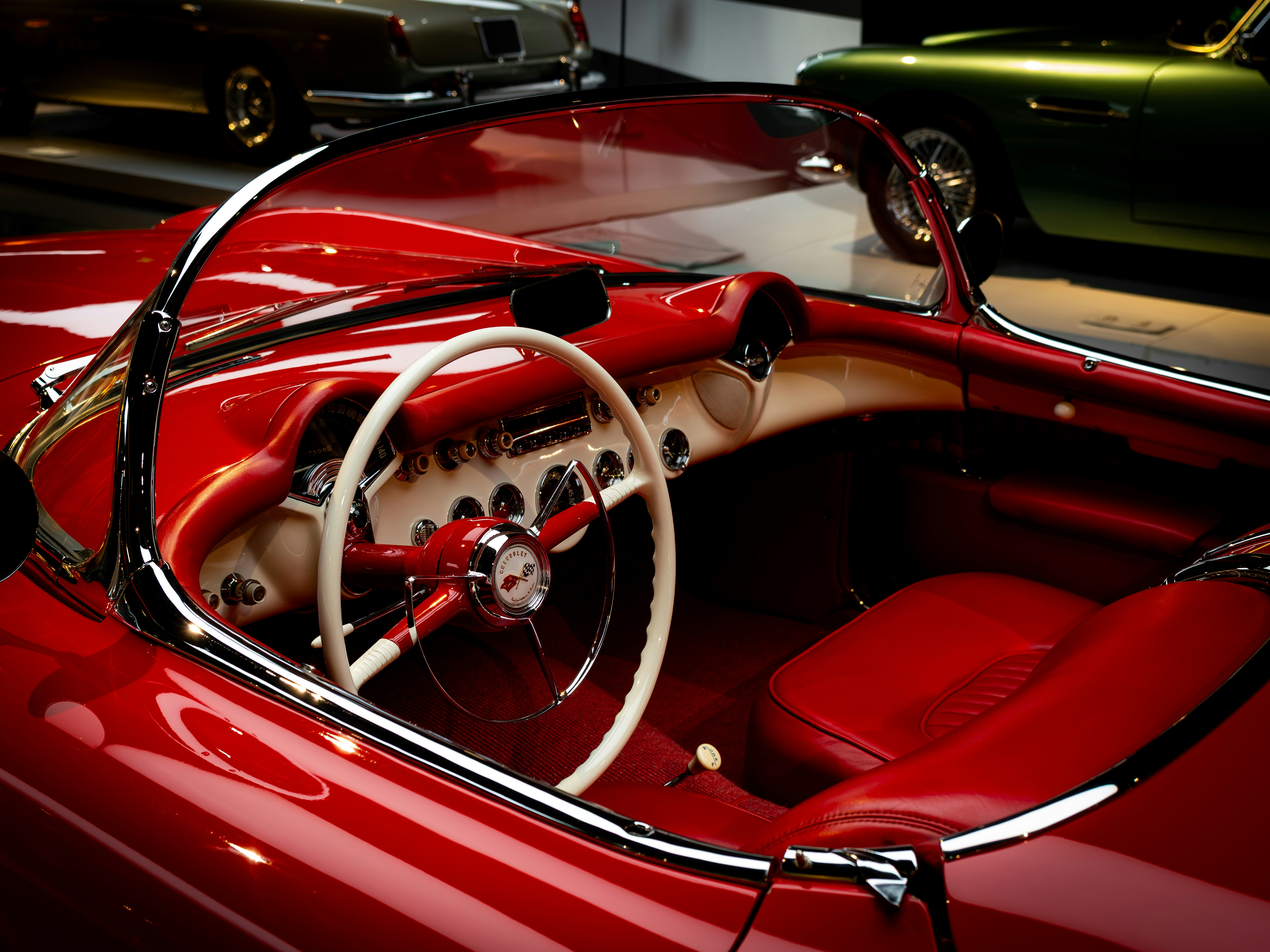 Crimson Cockpit: Vintage Red Roadster Interior in Focus