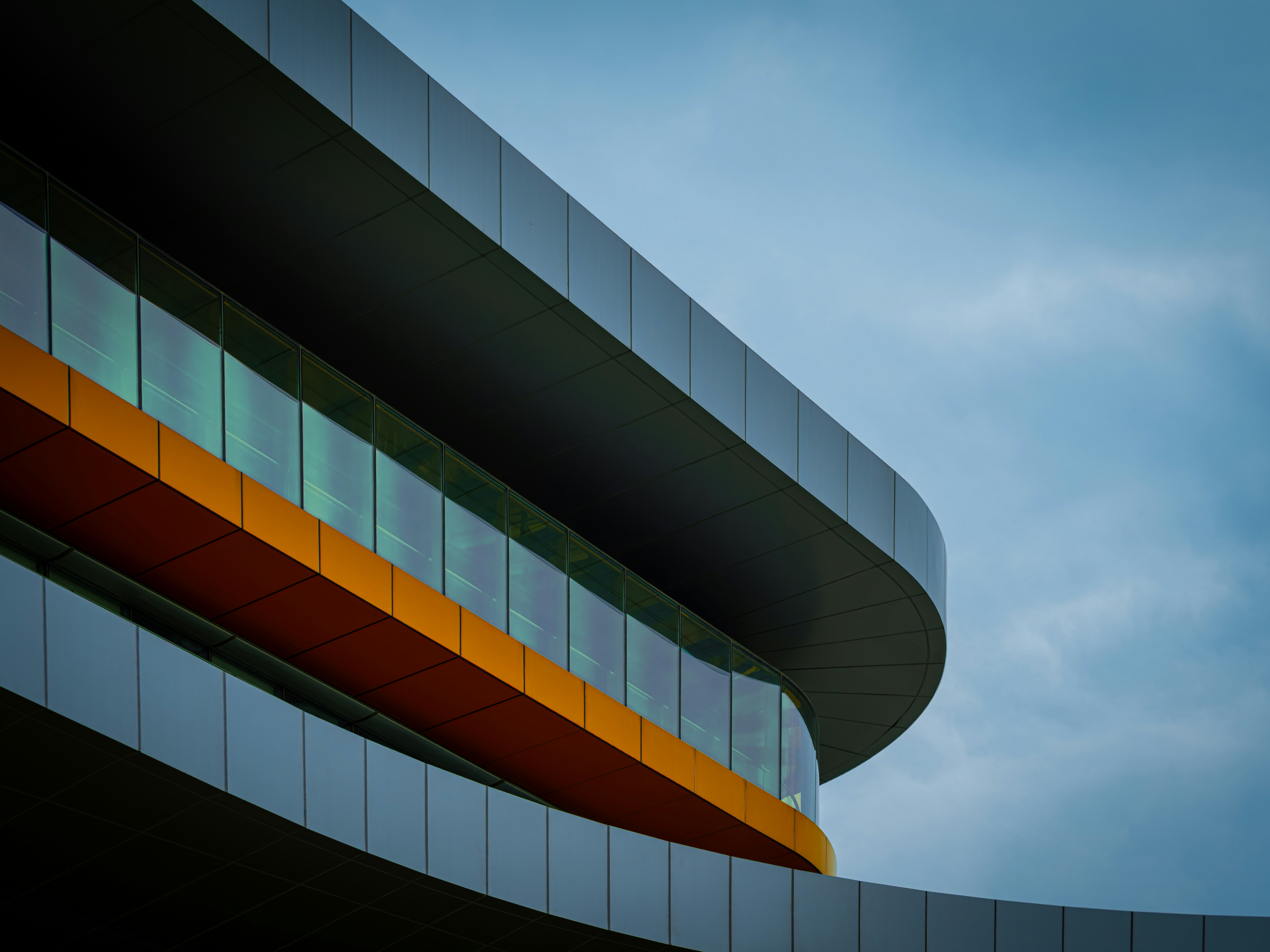 Color Stripes on a Curved Facade: Modern Architecture in Profile