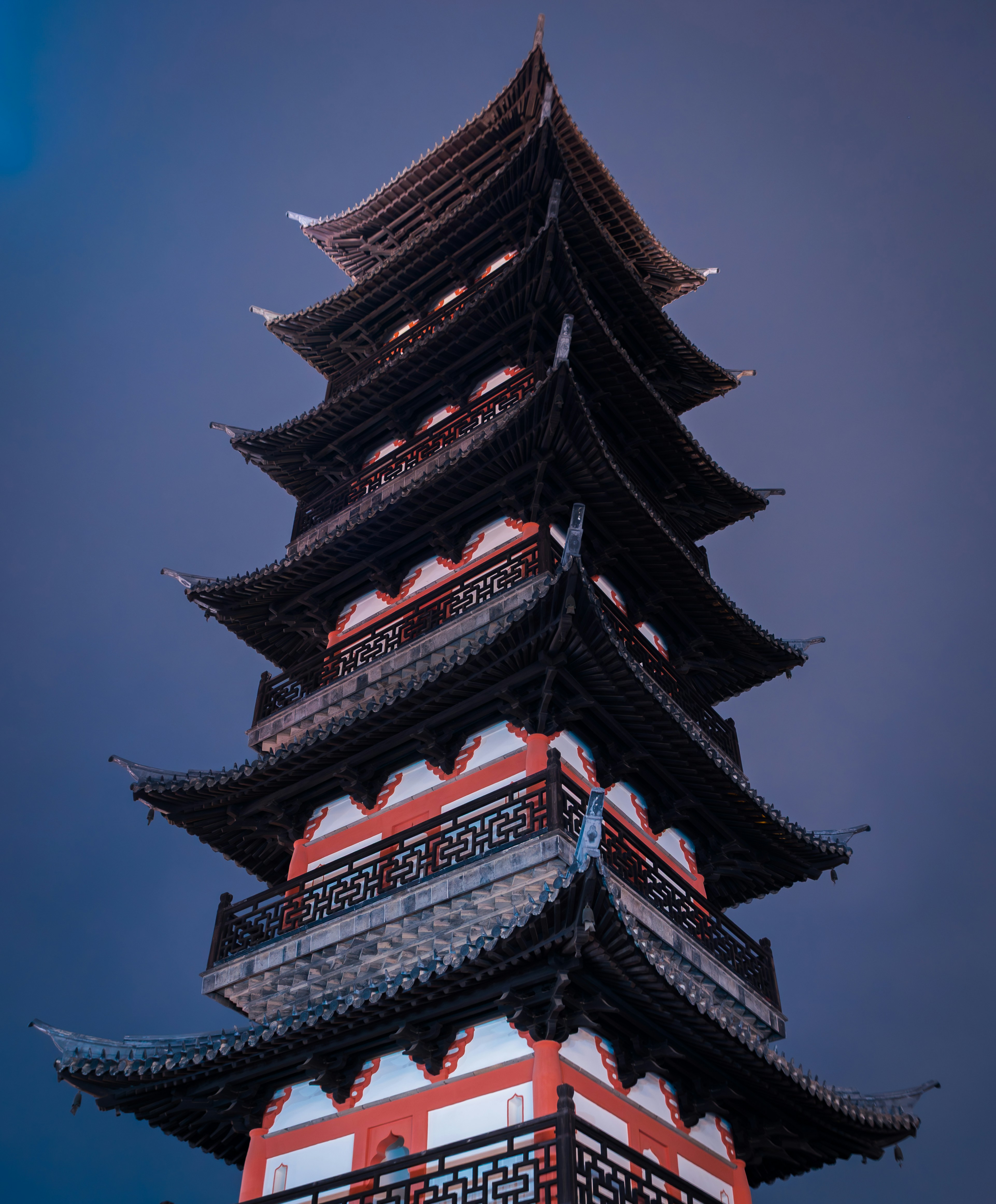 Eight-Tier Dawn: A Lantern-Red Pagoda Reaching Toward the Sky