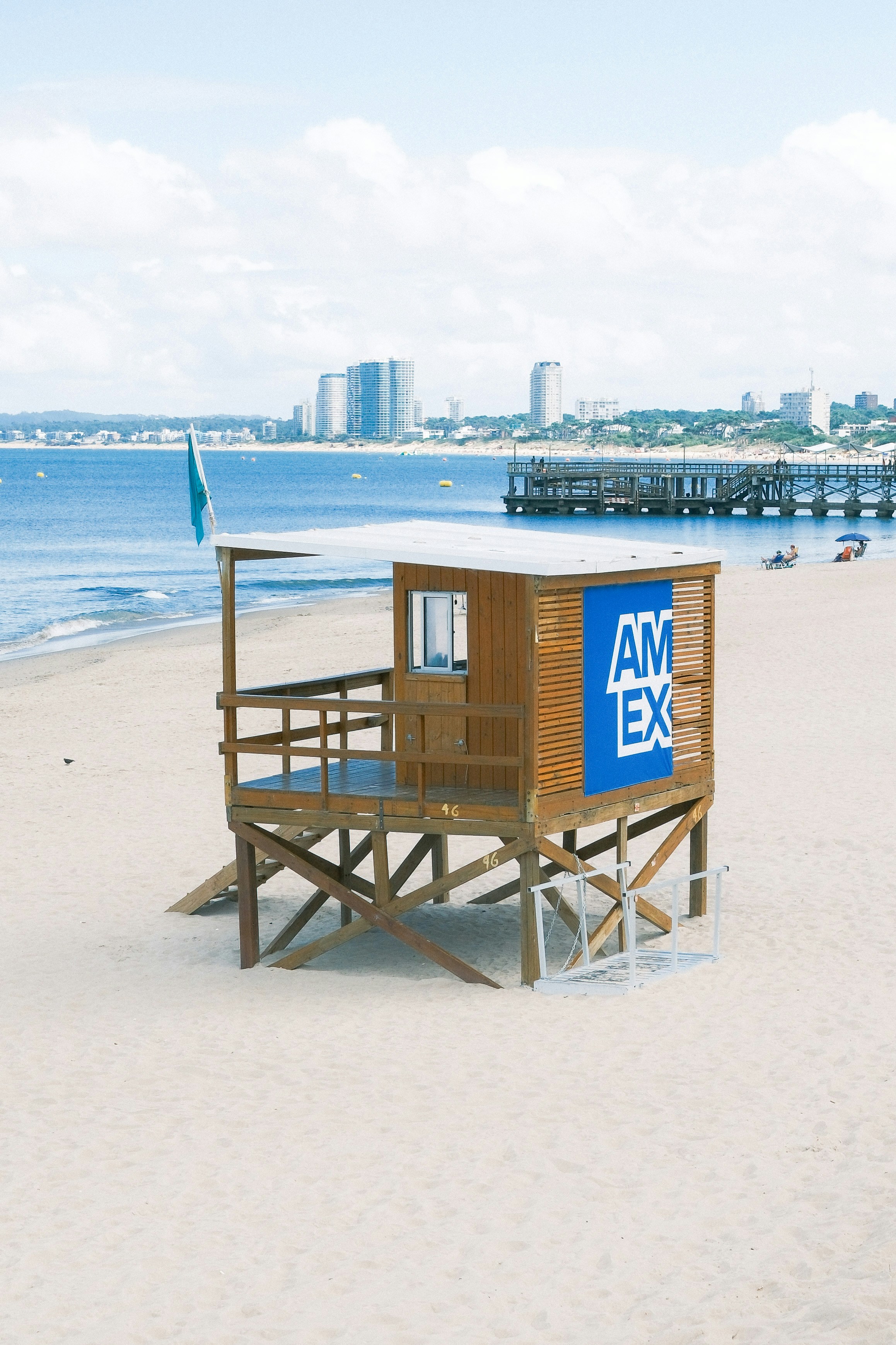 Lifeguard Station on Quiet Beach under a Clear Blue Sky
