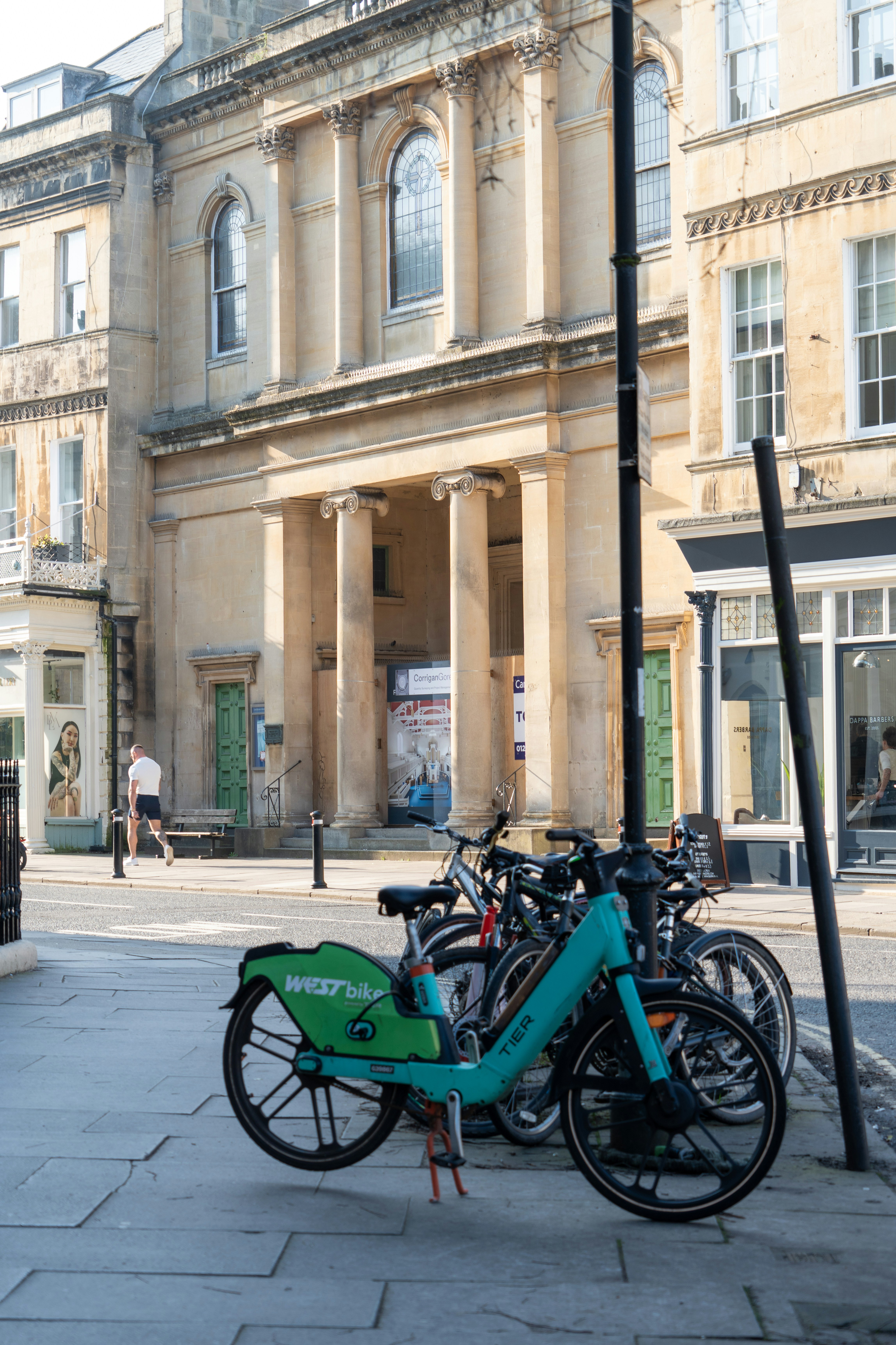 City Street Portrait: Bikes in Front of Historic Columns