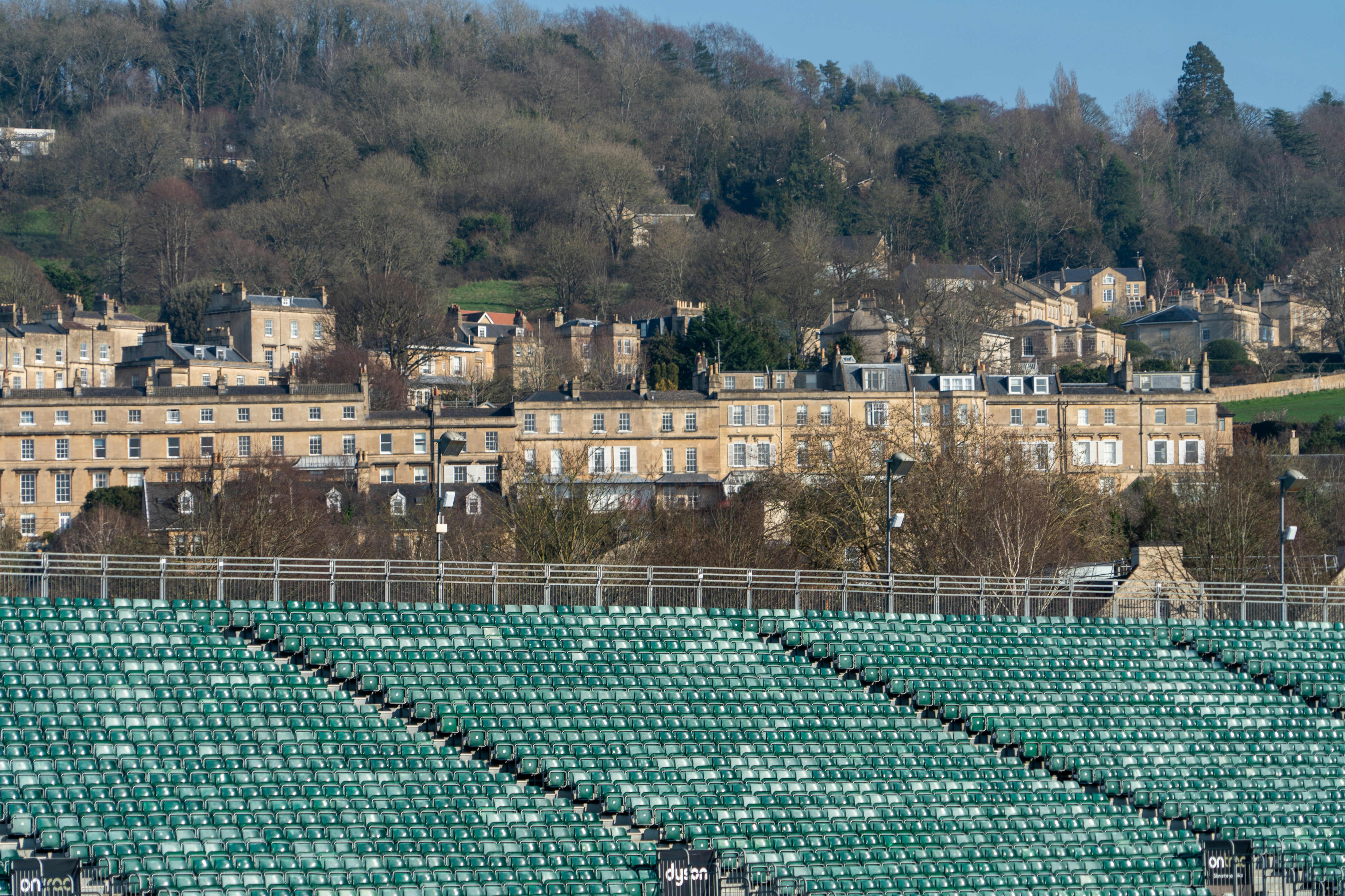 Green Terrace Panorama: Stadium Seating with Townscape Backdrop