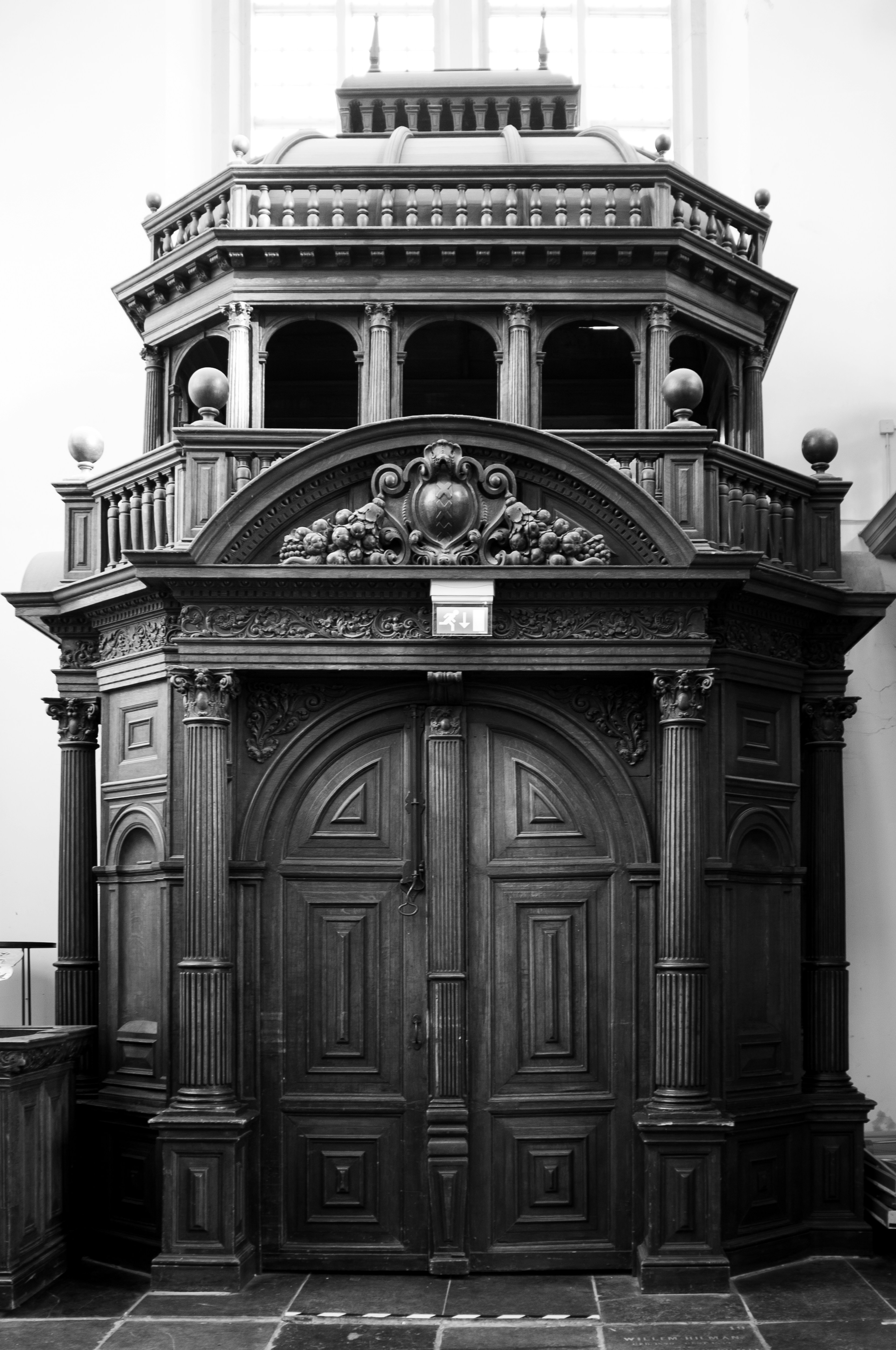 Ornate Wooden Portico: Grand Doorway in Monochrome Heritage
