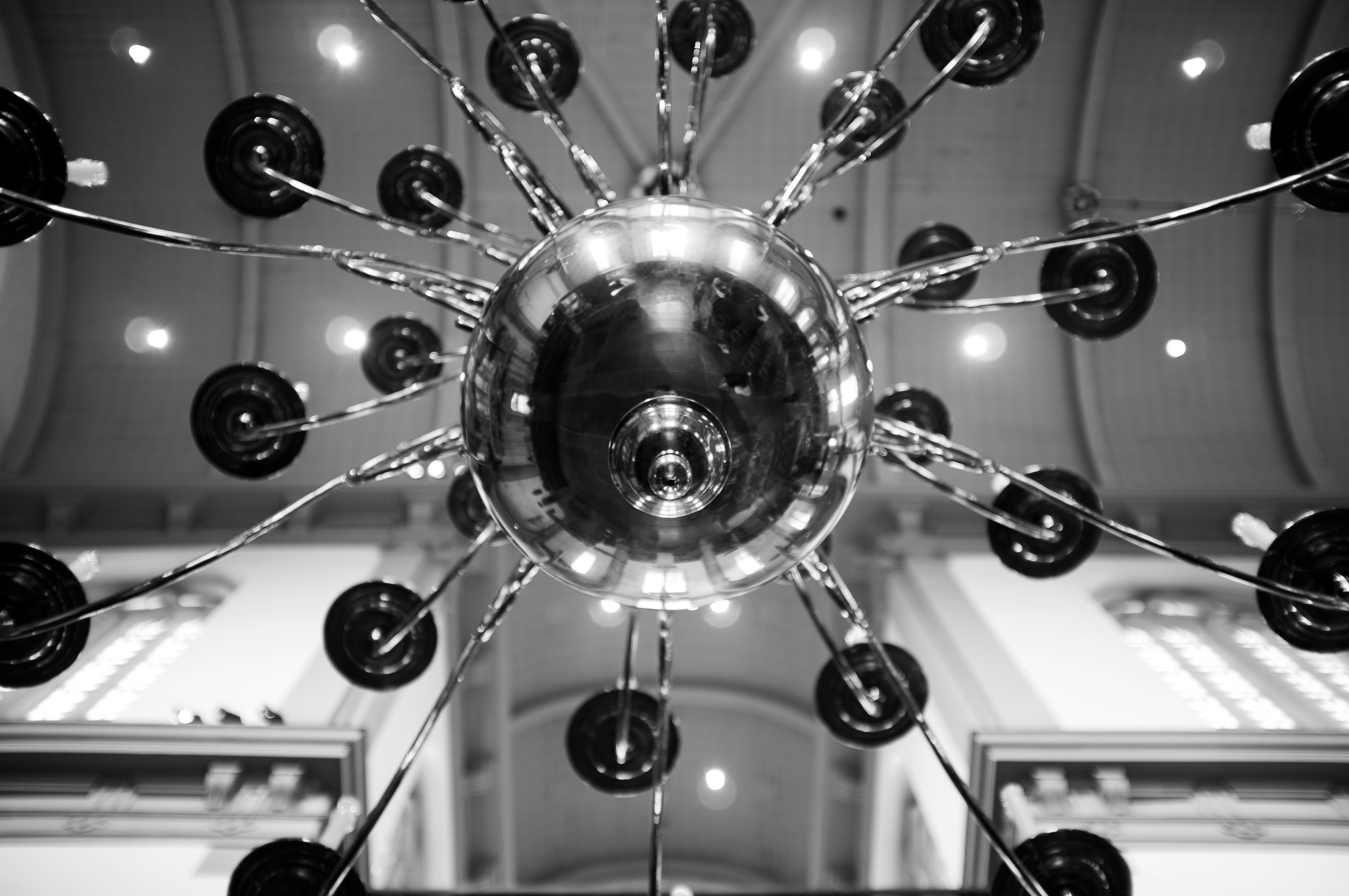 Chromed Firework: A Central Chandelier in Symmetrical Focus