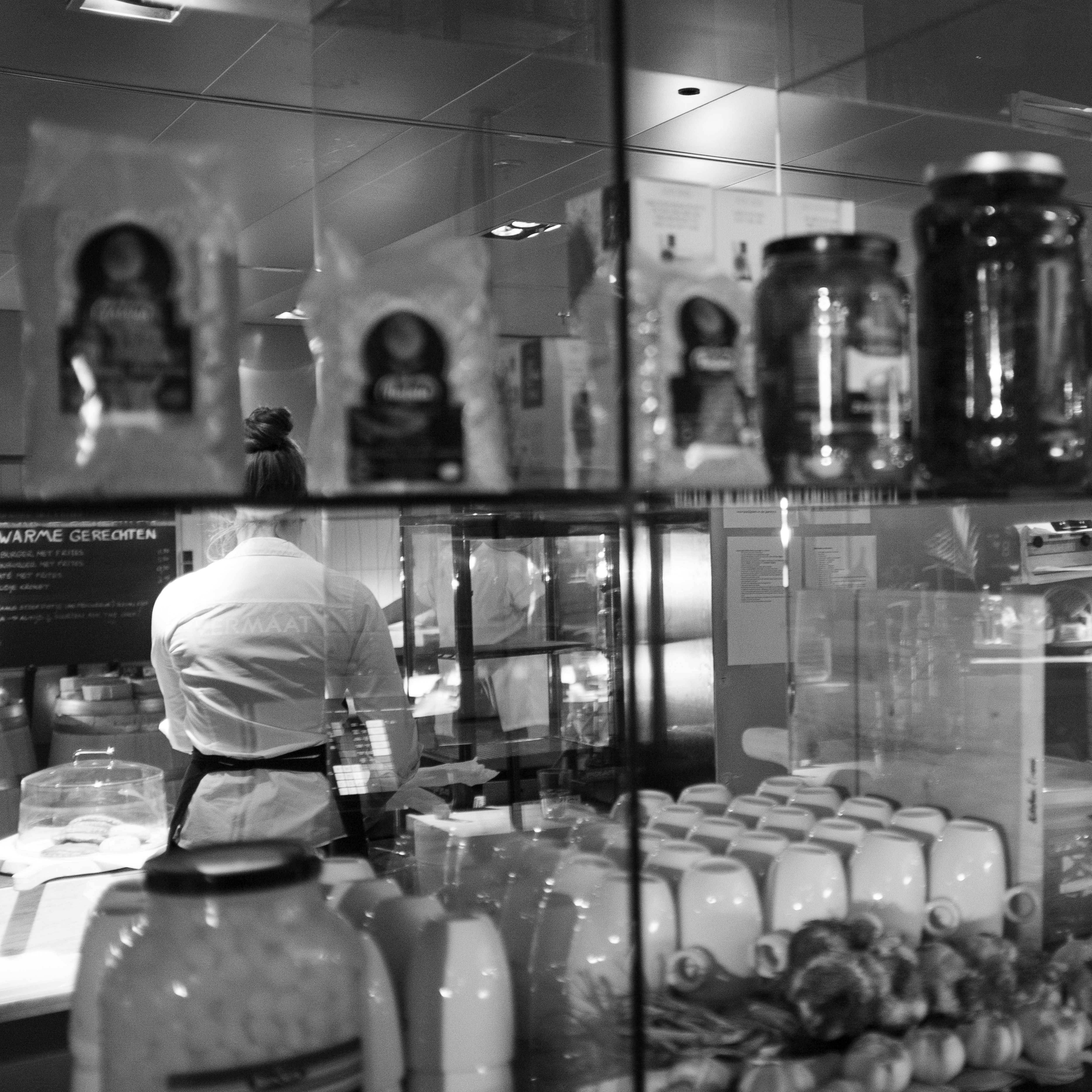 Through the Glass: A Quiet Shift in a Market Café