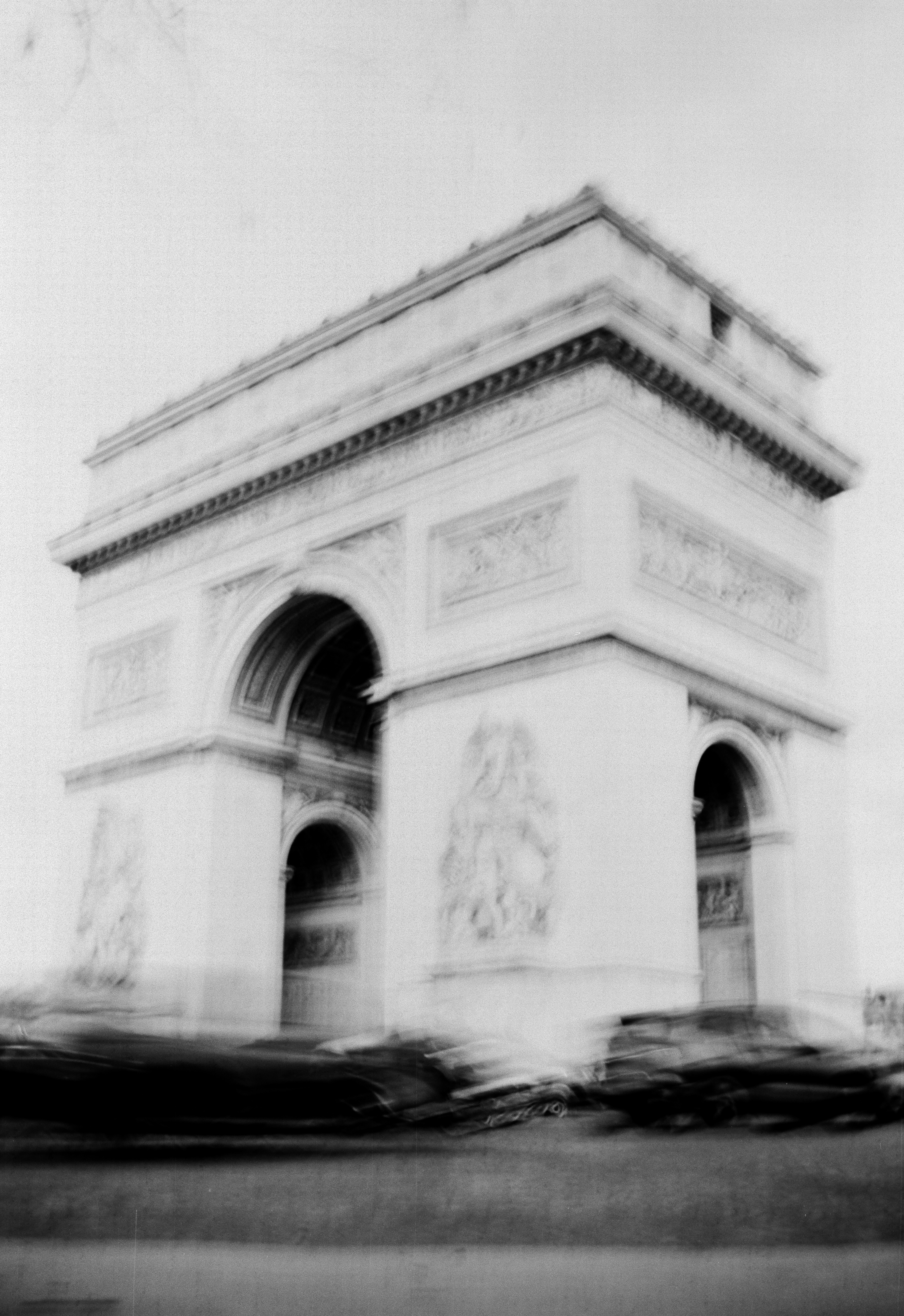 The arc de triomphe in paris with blurred motion photo – Free Travel ...