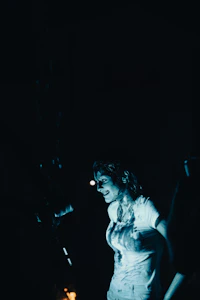 Under Neon Veil: A Fractured Portrait in Dim Blue