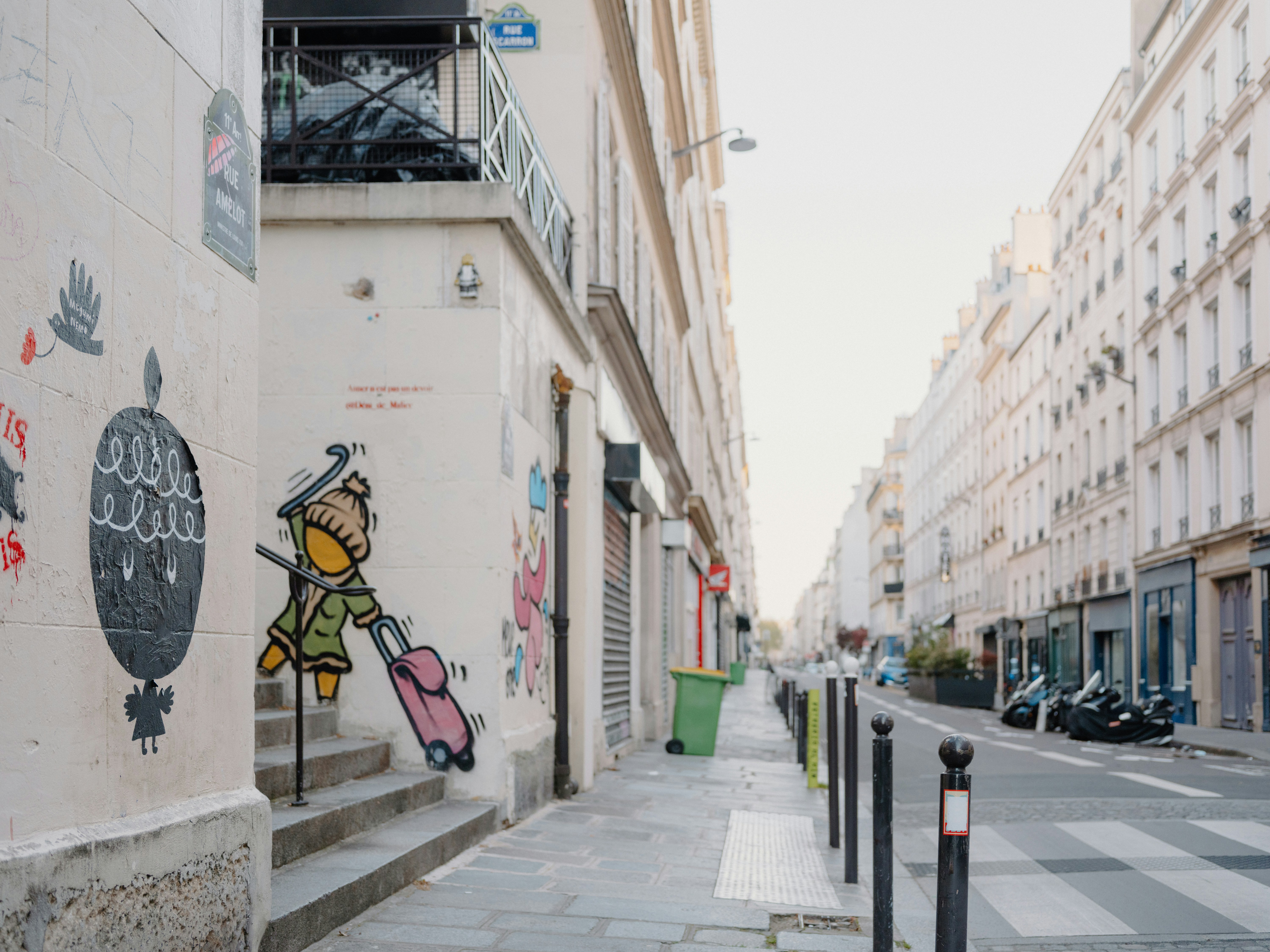 Graffiti Alleyway: A Quiet Paris Morning Yet to Unfold