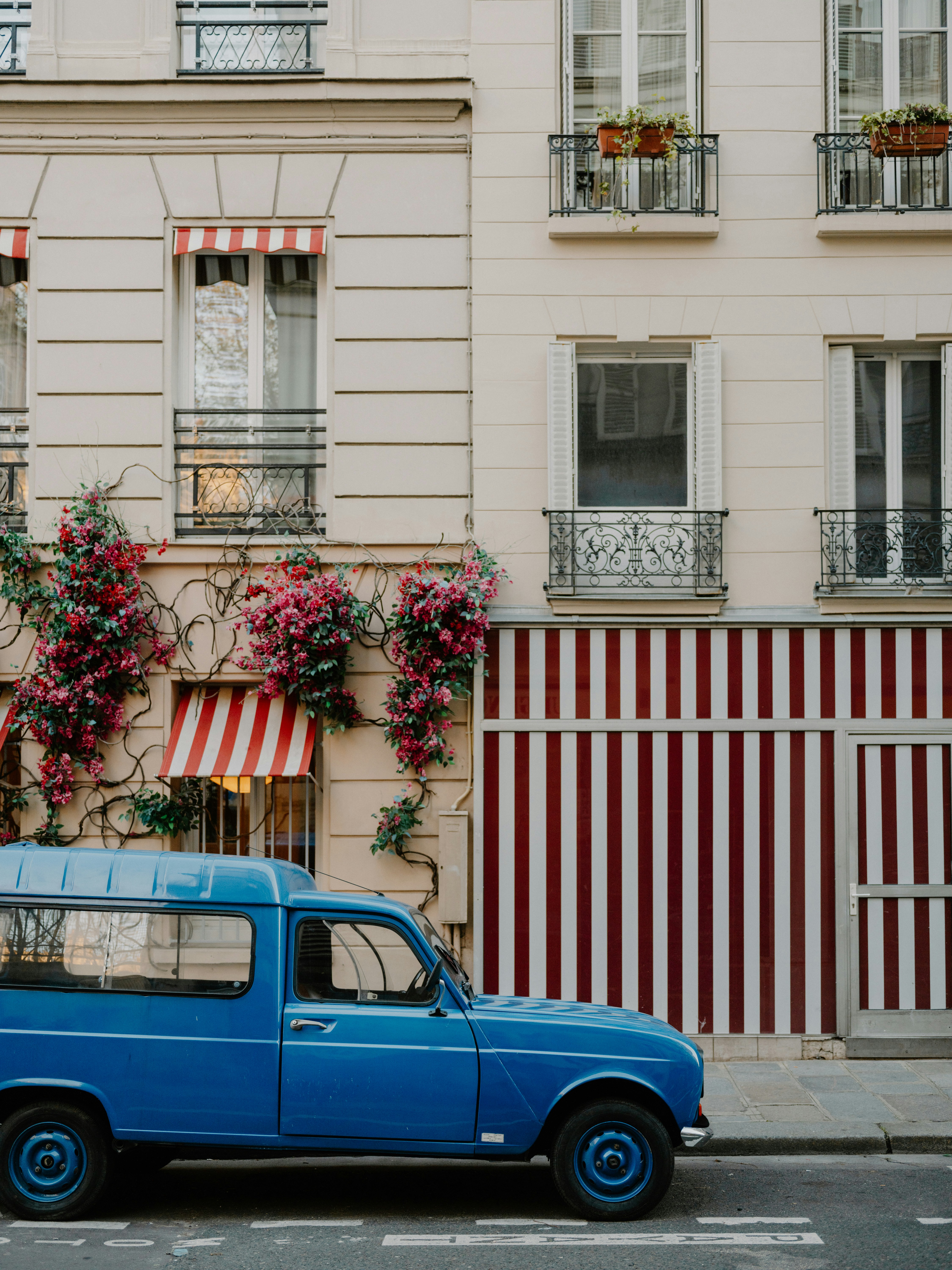 Blue Vintage Van Meets Striped Paris Facade