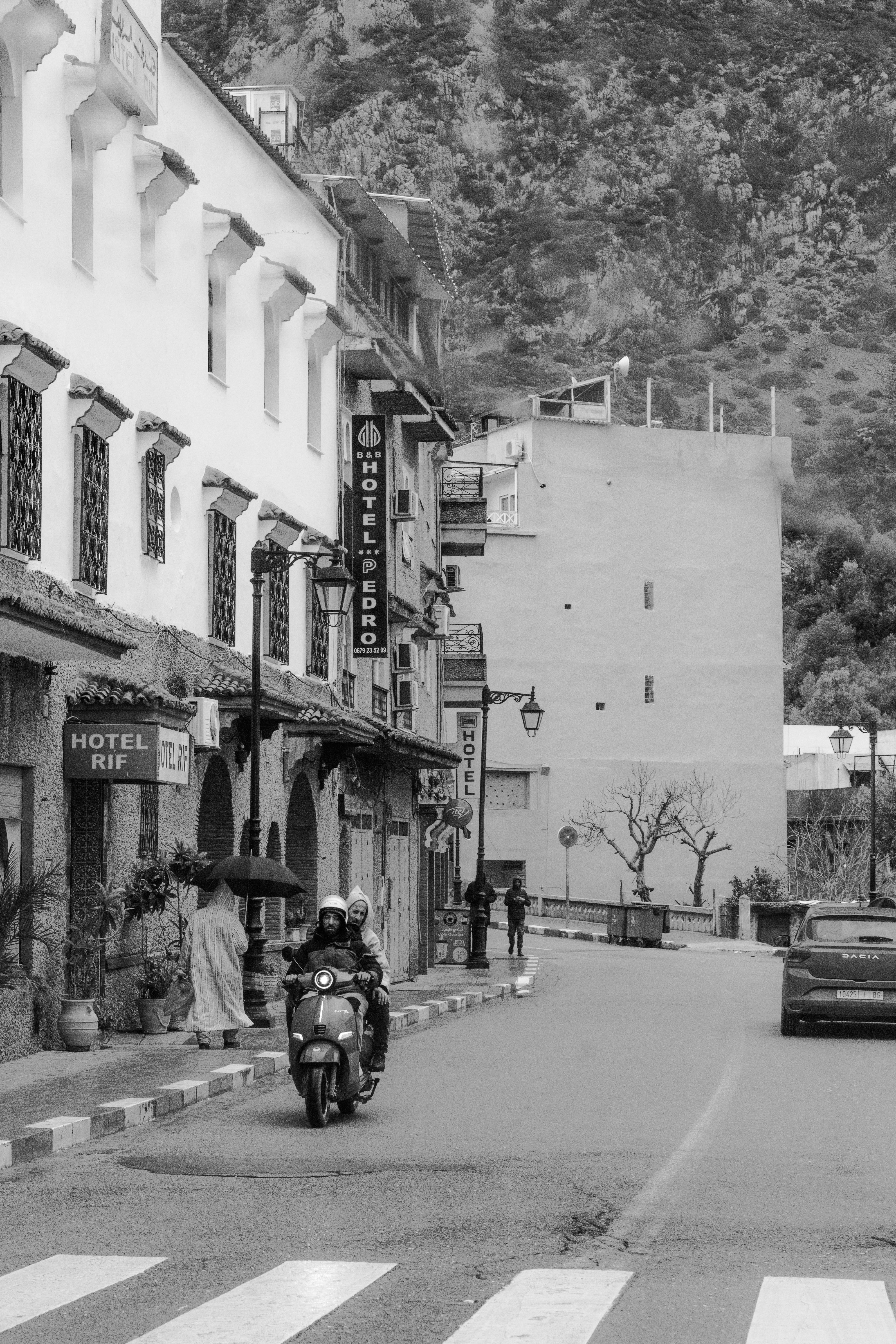 Motorcycle Courier in a Quiet Mountain Town