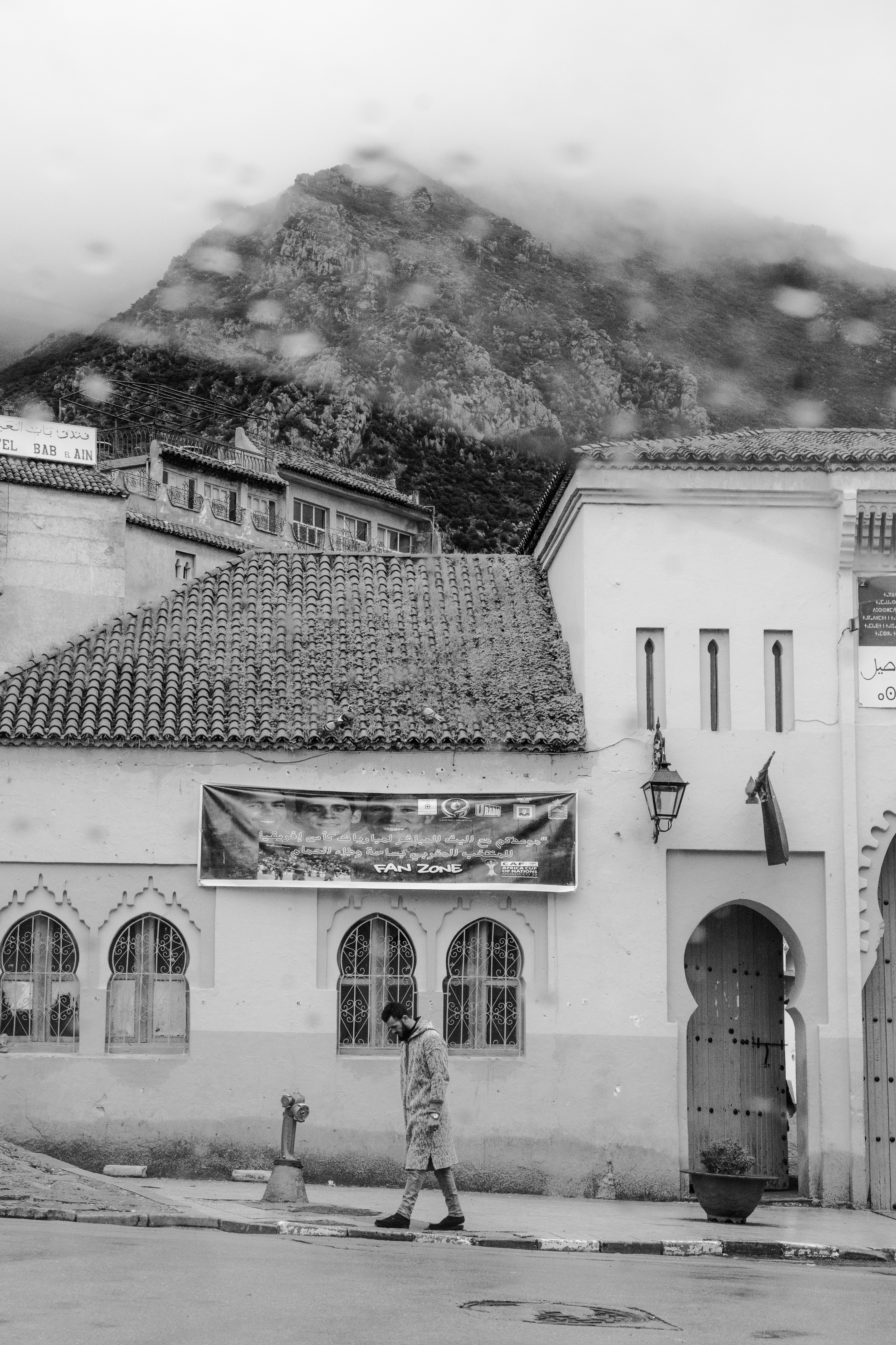 Moonlit Facade: A Quiet Moment Behind the Mountain Town