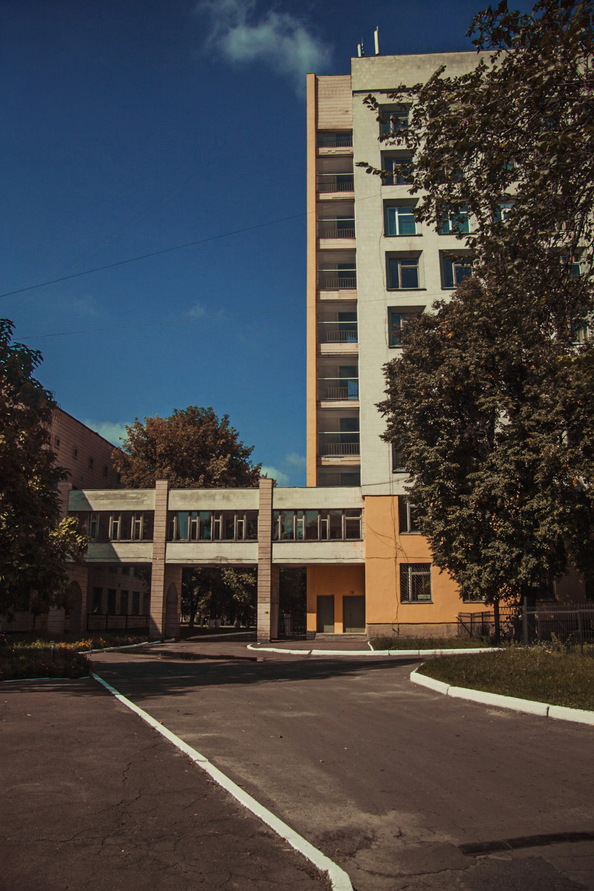 Urban Cascade: A Mid-Century Campus Tower Framed by Shadow and Light