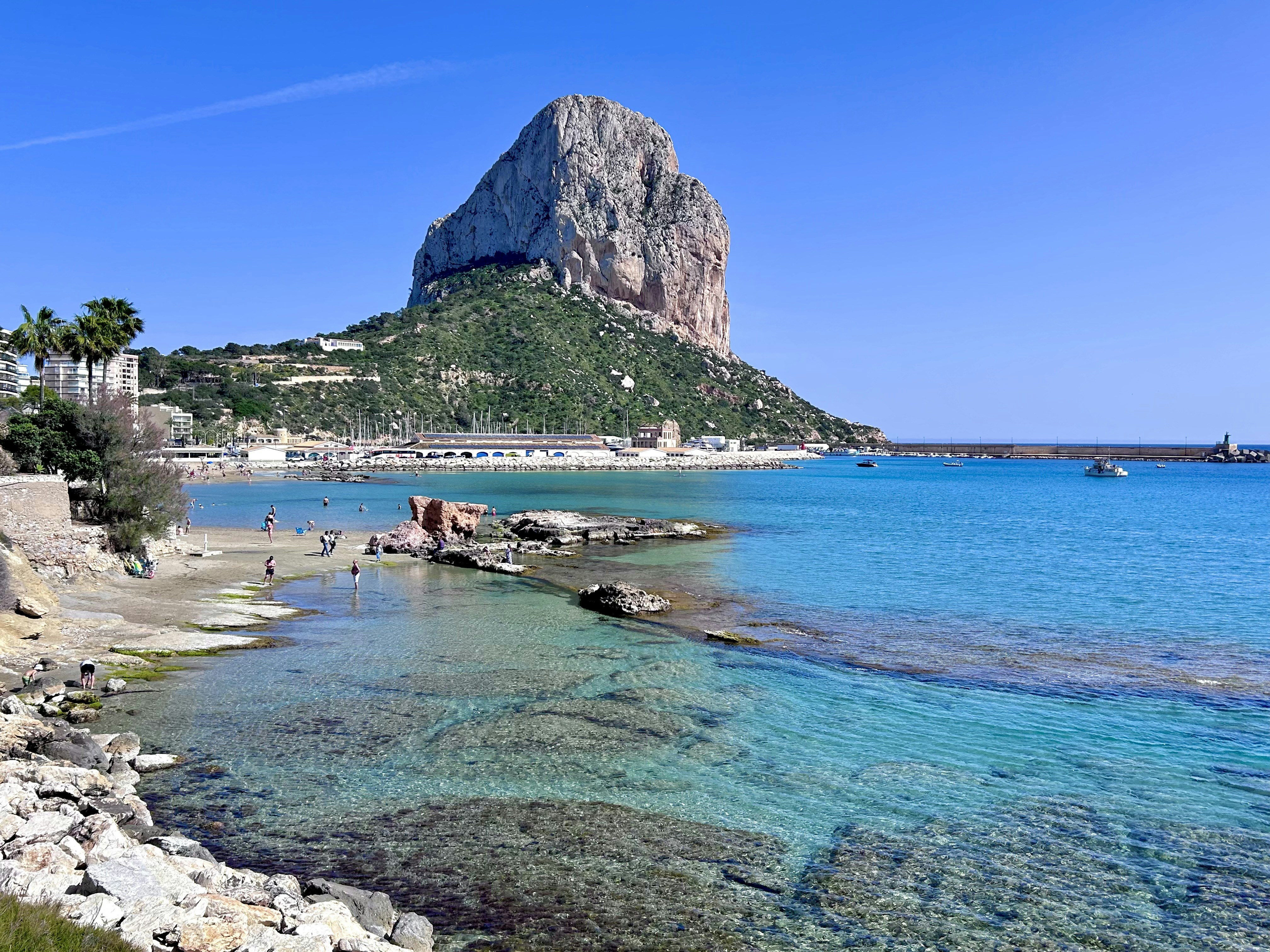 Stone Sentinel: Mindaro’s Prominent Sea Stack at Dazzling Blue