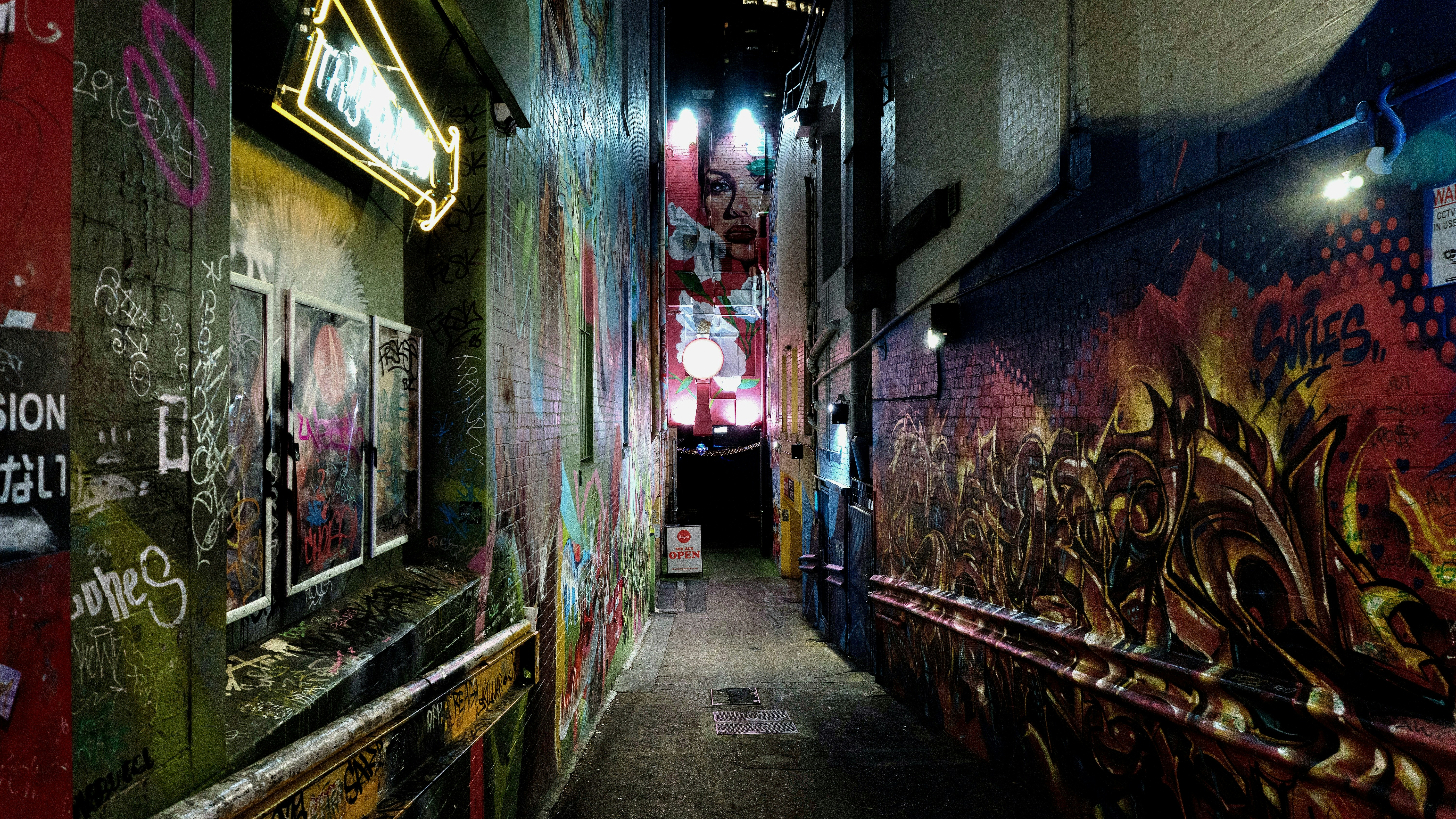 Neon Alley Portrait: A Graffiti Corridor Toward Light