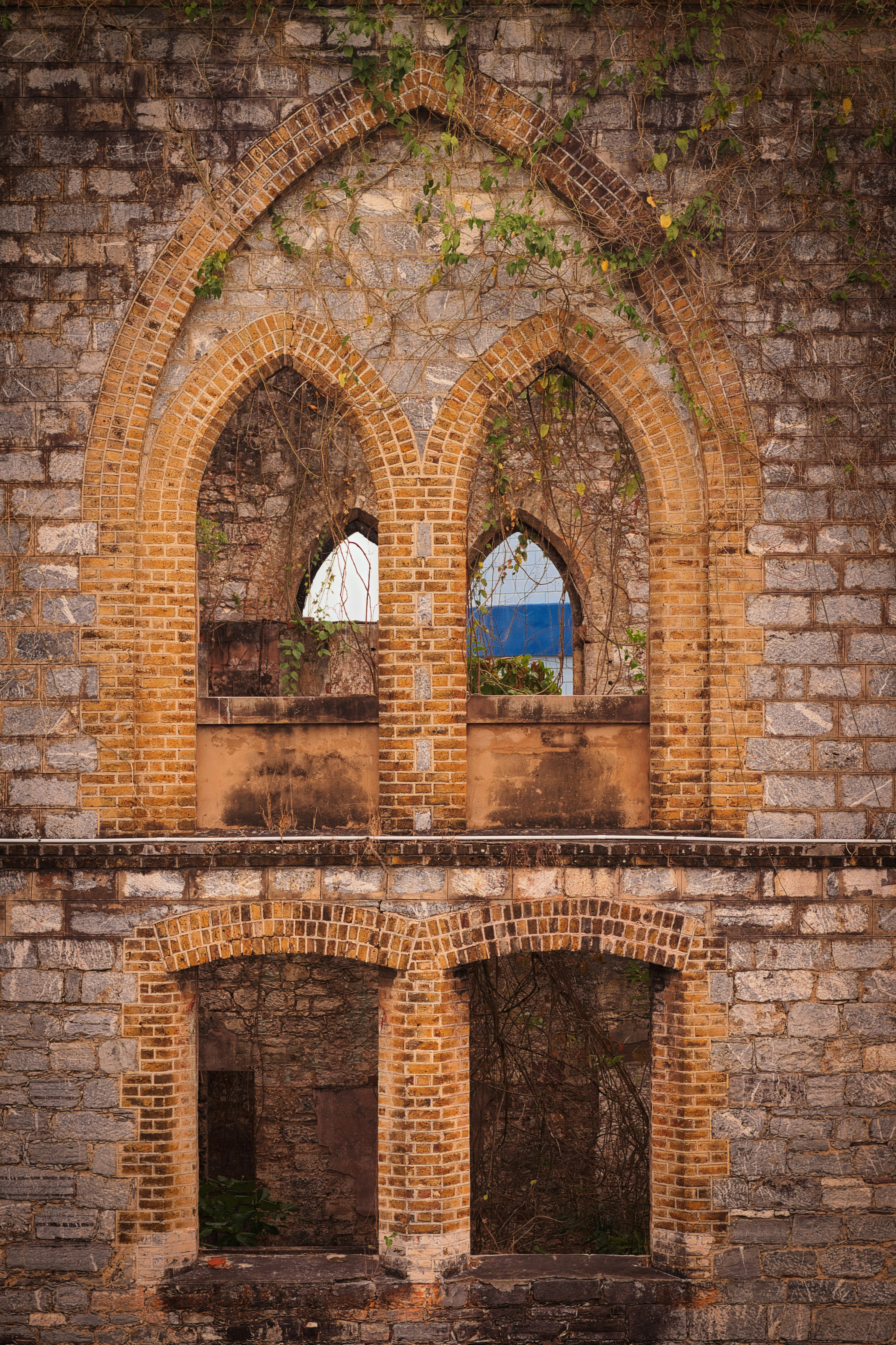 Ruined Brick Archways Framing a Hidden Passage