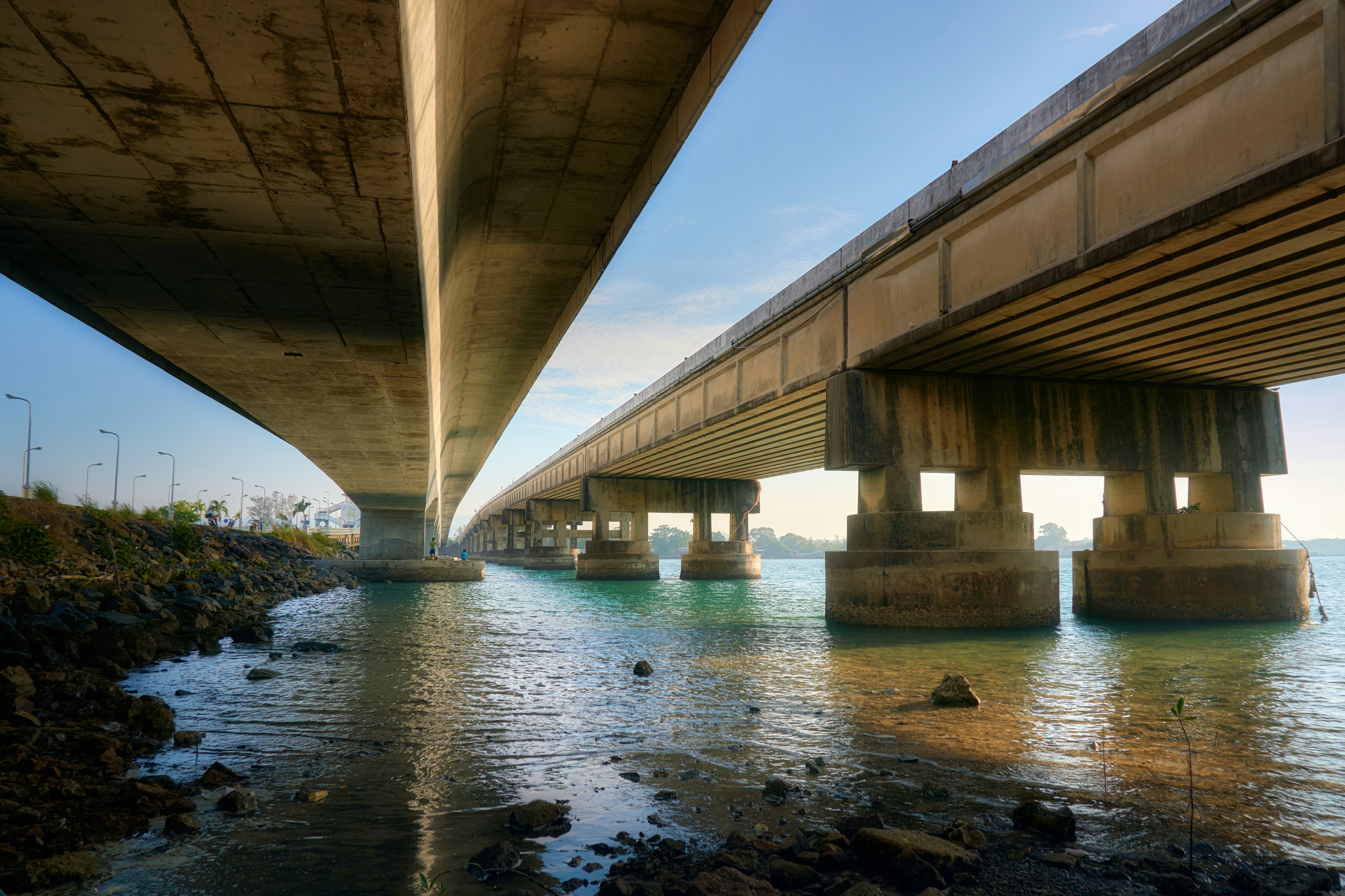 Under the Span: A Quiet River Crossing of Concrete and Light
