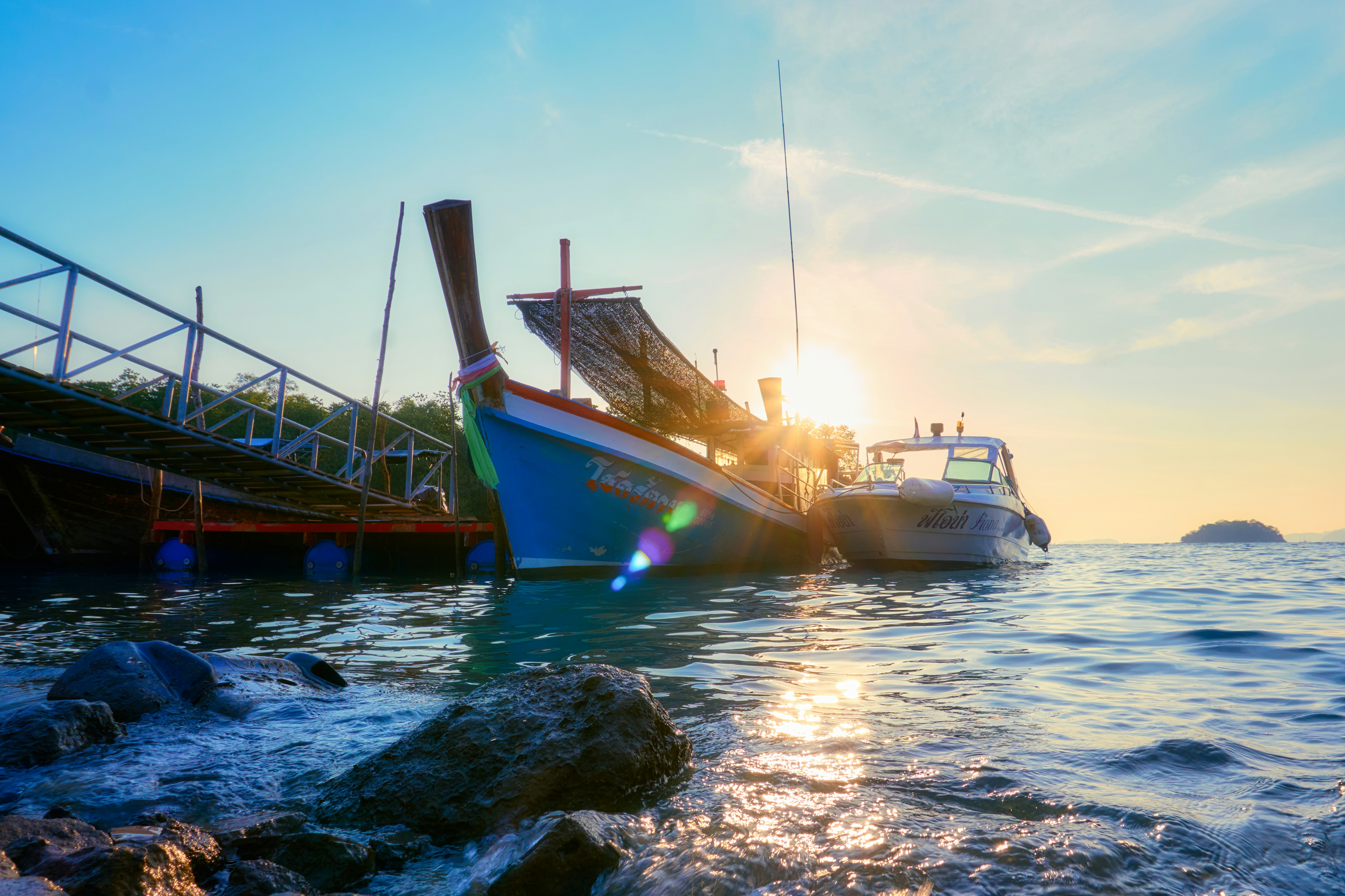 Sunlit Harbor: Boats Resting at Dusk