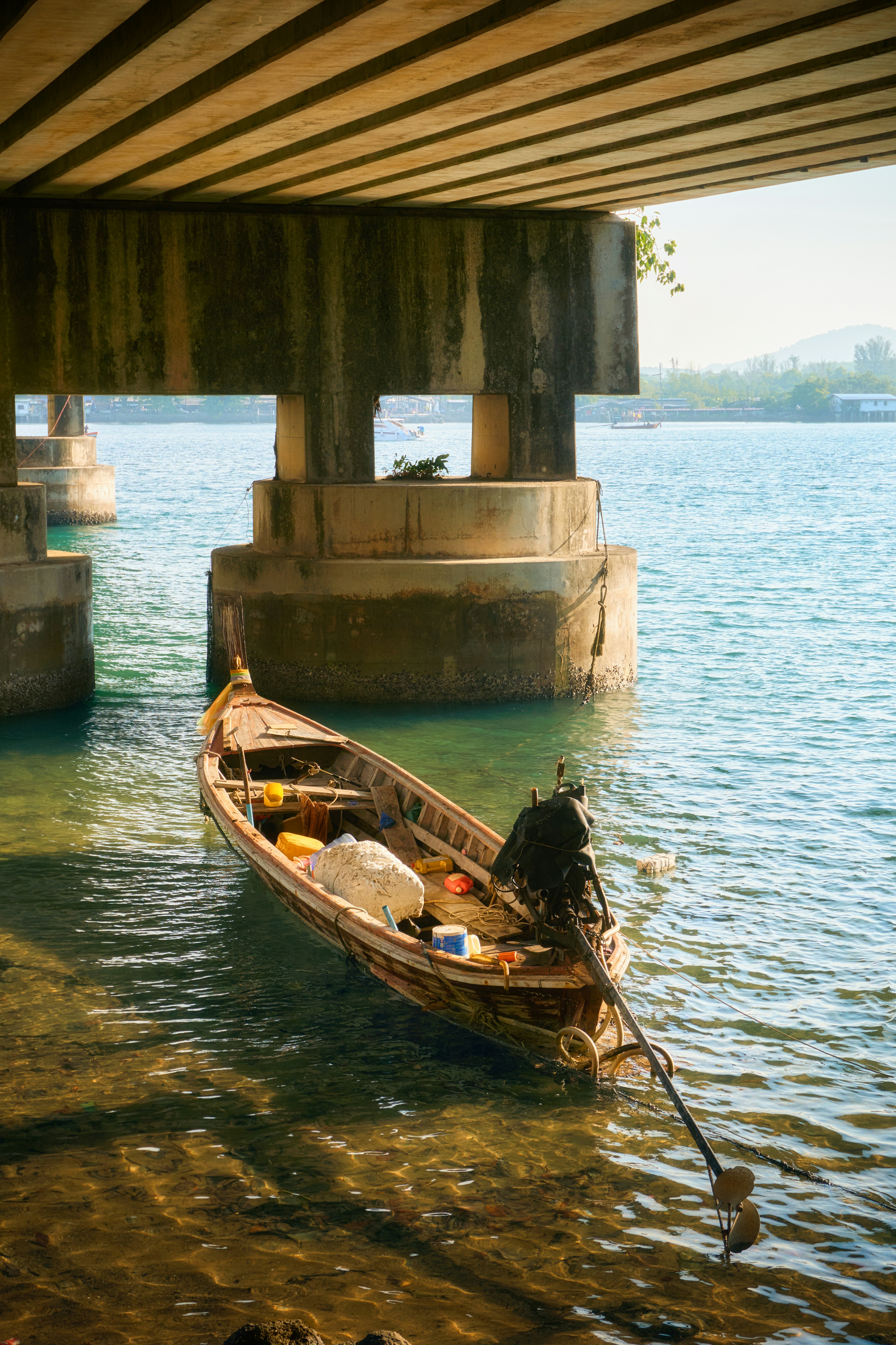 Under the Bridge: A Lone Workboat Beckons from Tidal Rest