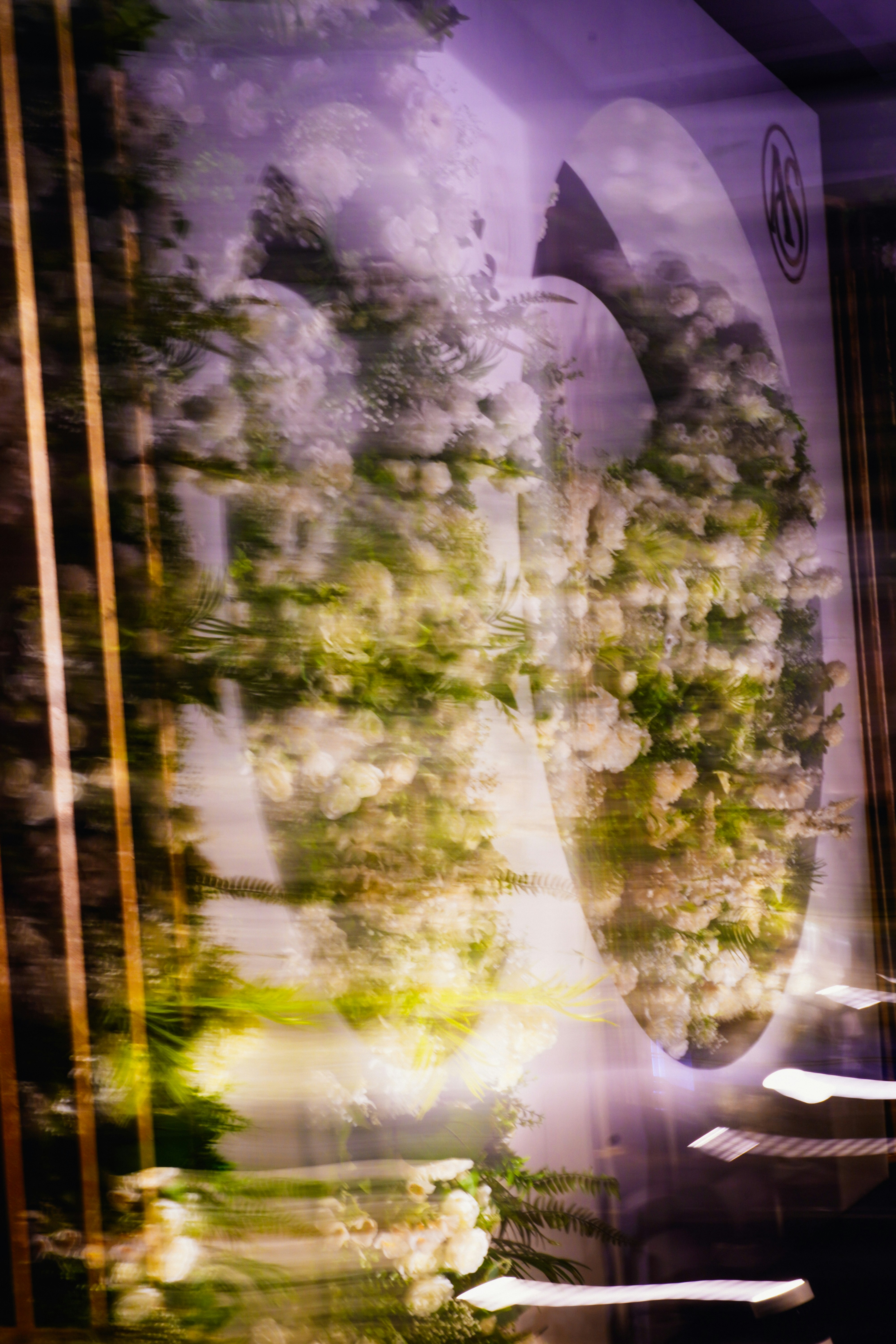 Floral Echoes in a Gleaming Glass Window